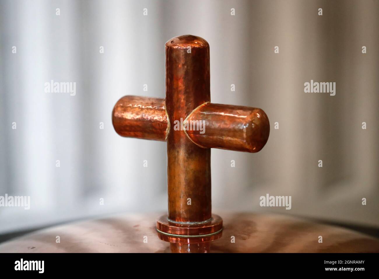 Christian cross in copper. France Stock Photo - Alamy