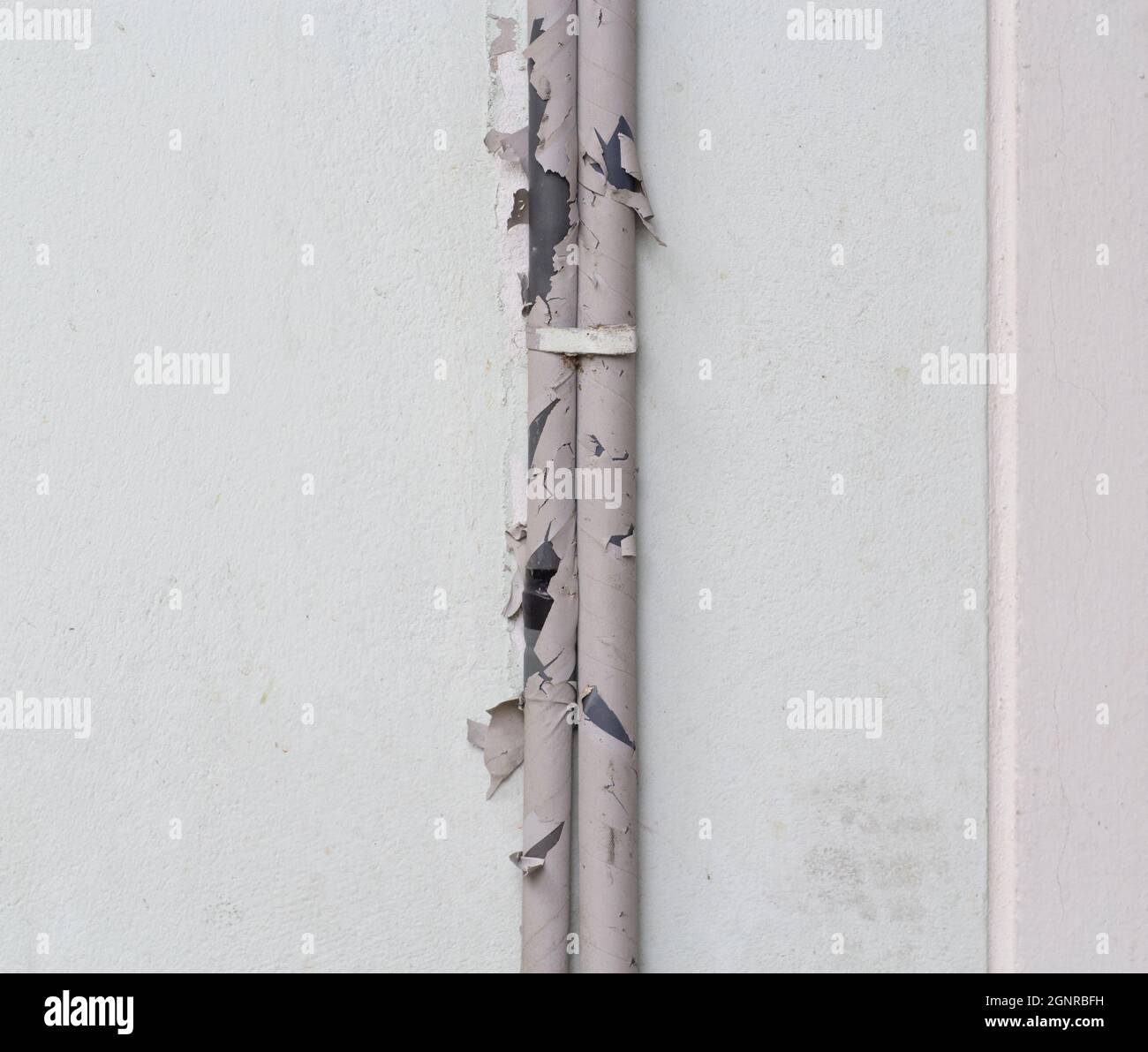 Broken outdoor air conditioner ducts on building wall Stock Photo - Alamy