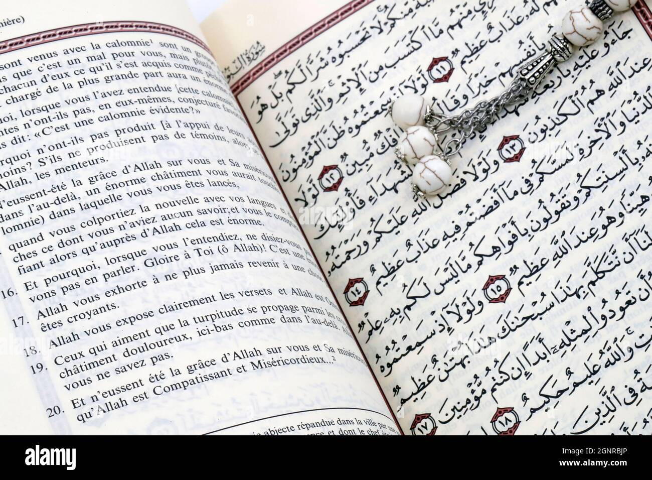 Open Holy Quran in french and arabic. Religious text. Name of Allah ...