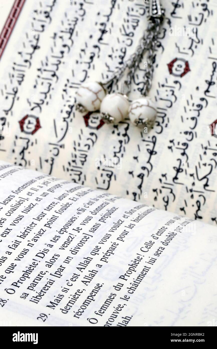 Open Holy Quran in french and arabic. Religious text. Name of Allah ...