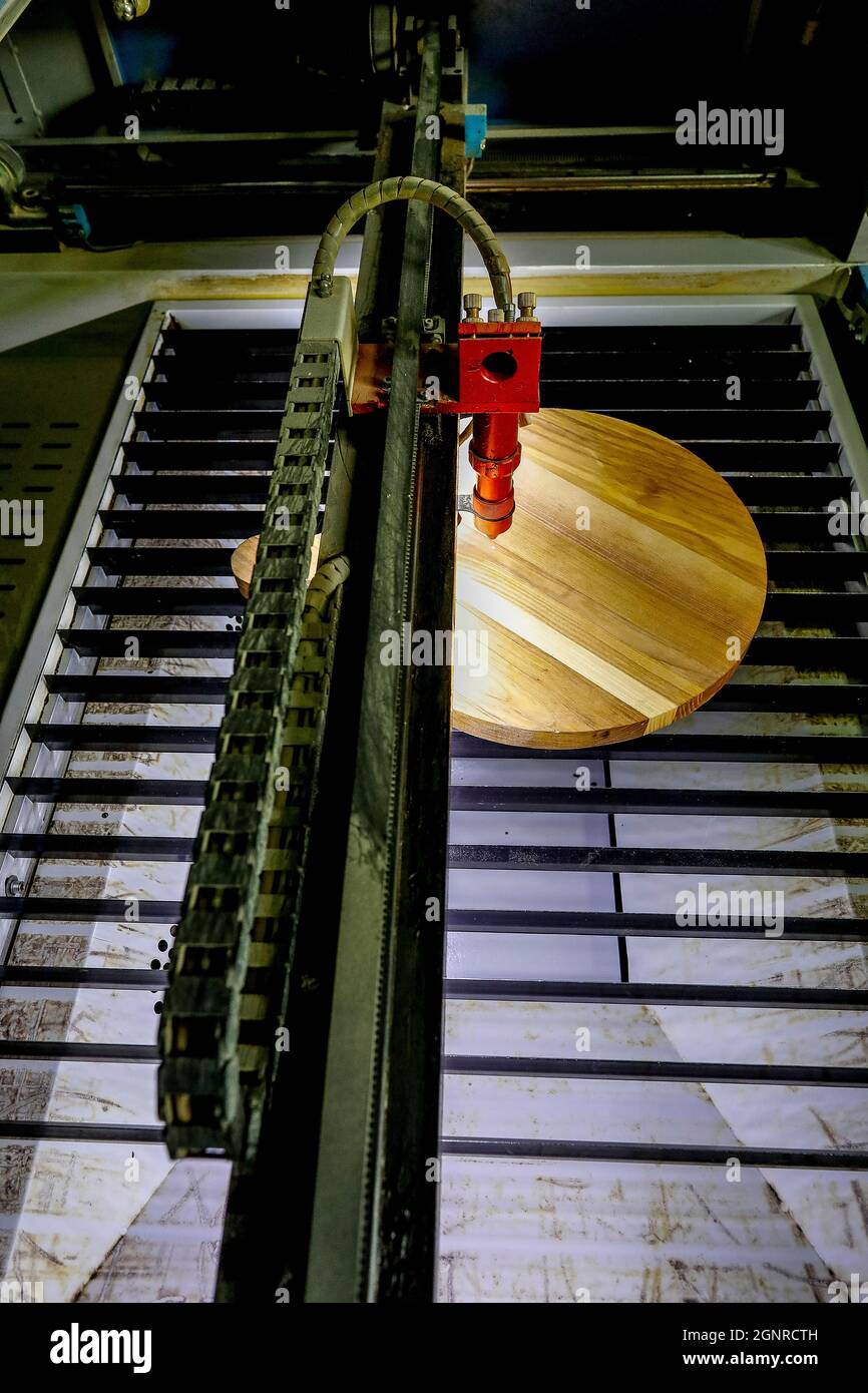 Laser engraving machine at work in a workshop in Manoilesti, Moldova ...