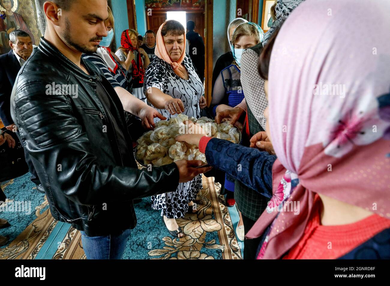 Blessed bread distribution at the end of mass in Cosauti monastery ...