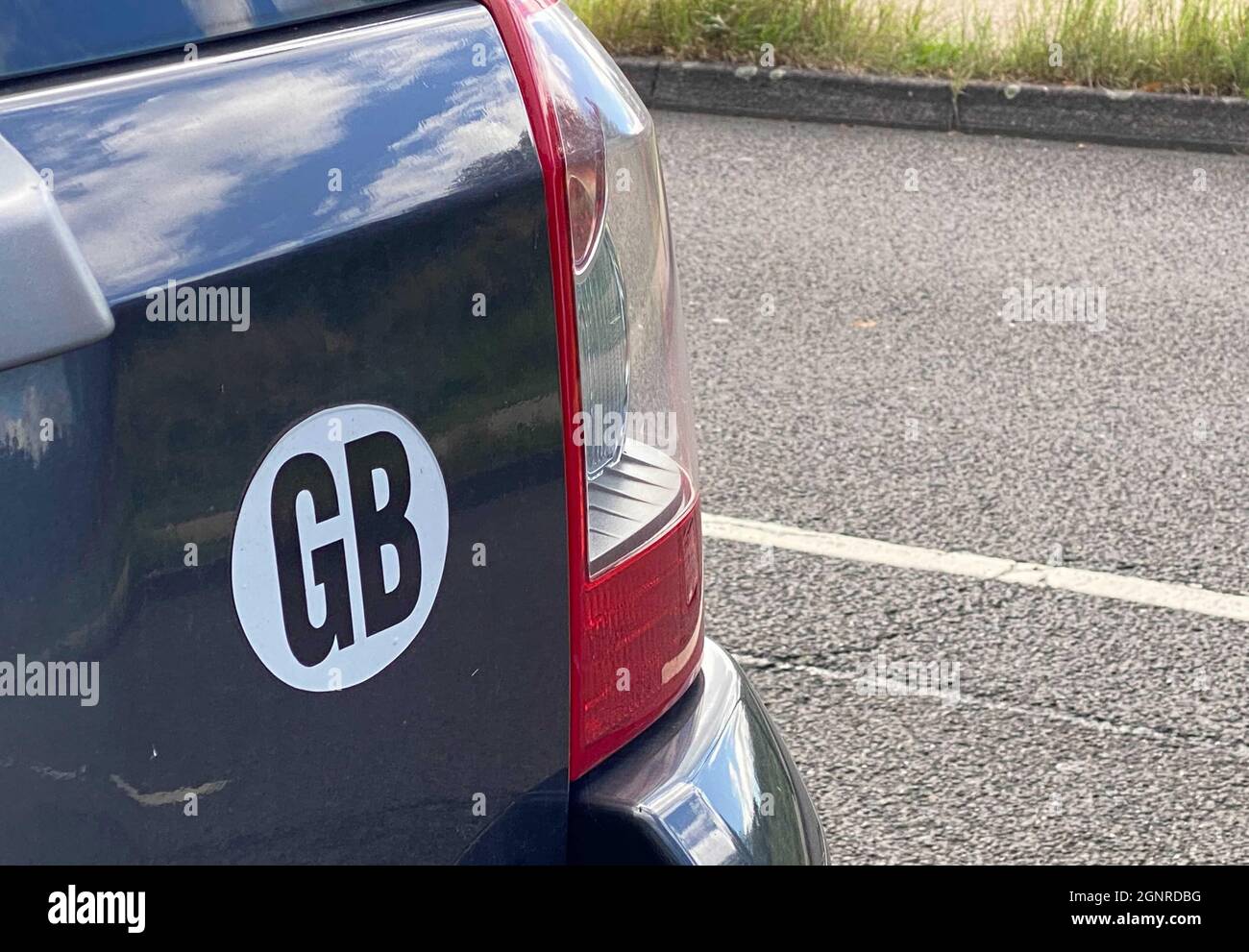 27 September 2021, United Kingdom, London: A "GB" sticker is stuck on a ...