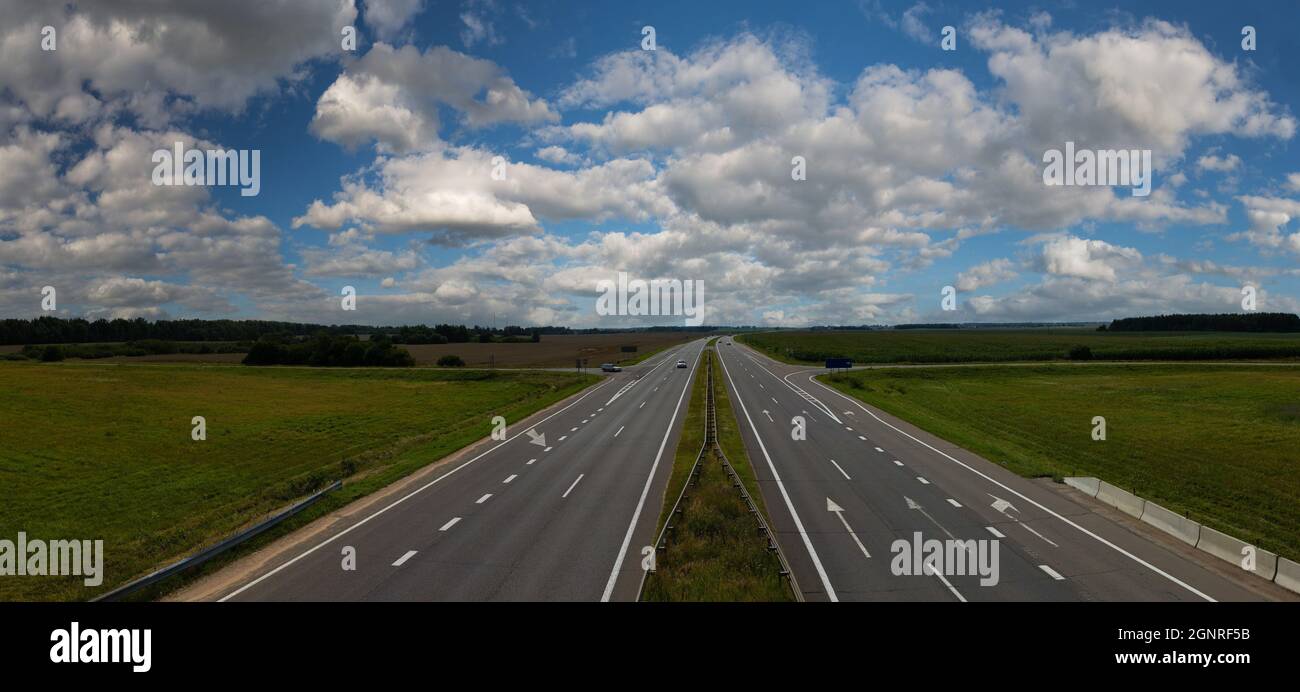 Evening sun view. Bridge on the highway, roadside and asphalt, in ...