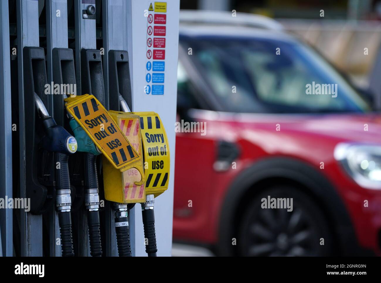 A sign on fuel pumps showing no fuel available at a BP petrol station ...