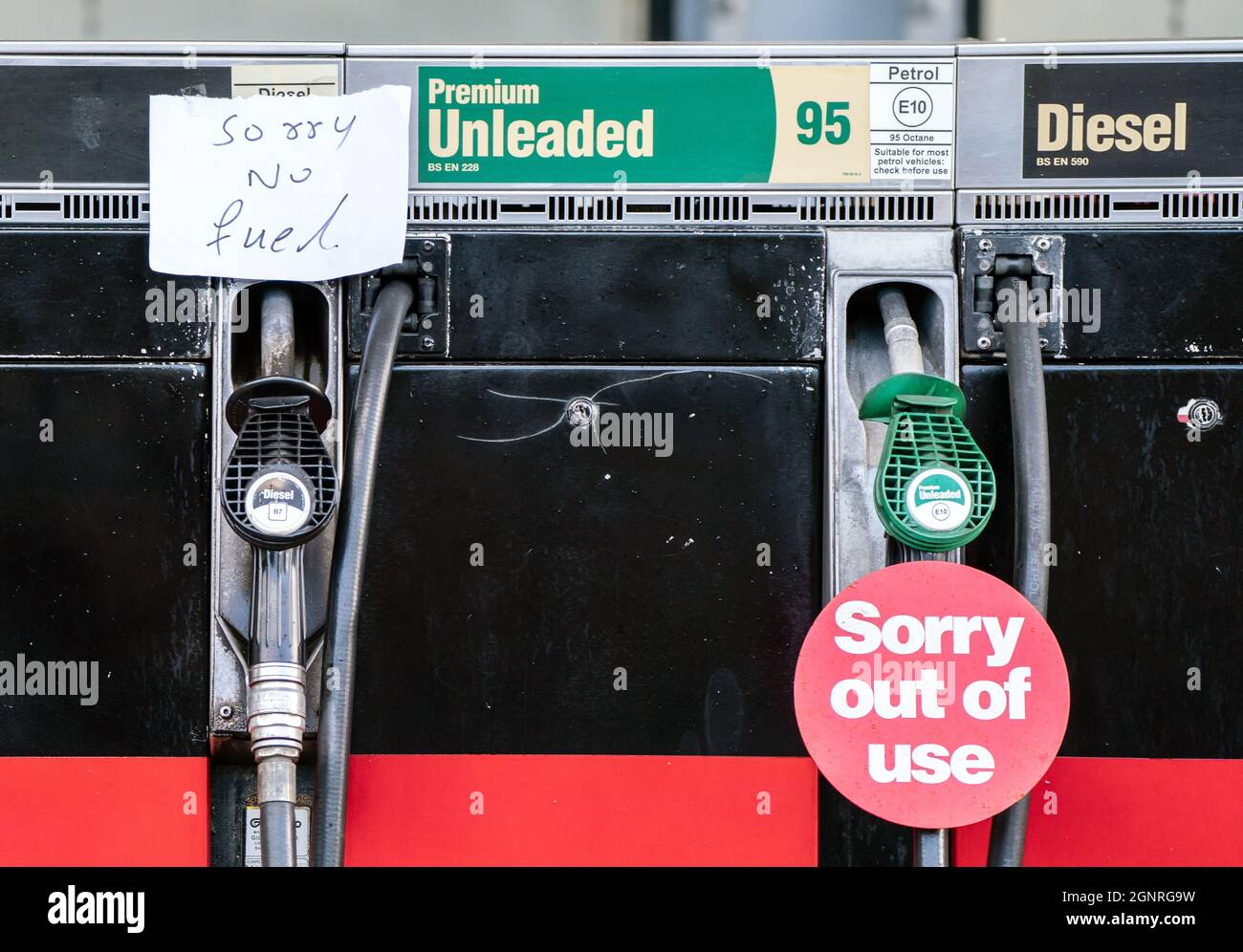 Fuel pumps out of use at a deserted petrol station forecourt in Honley ...