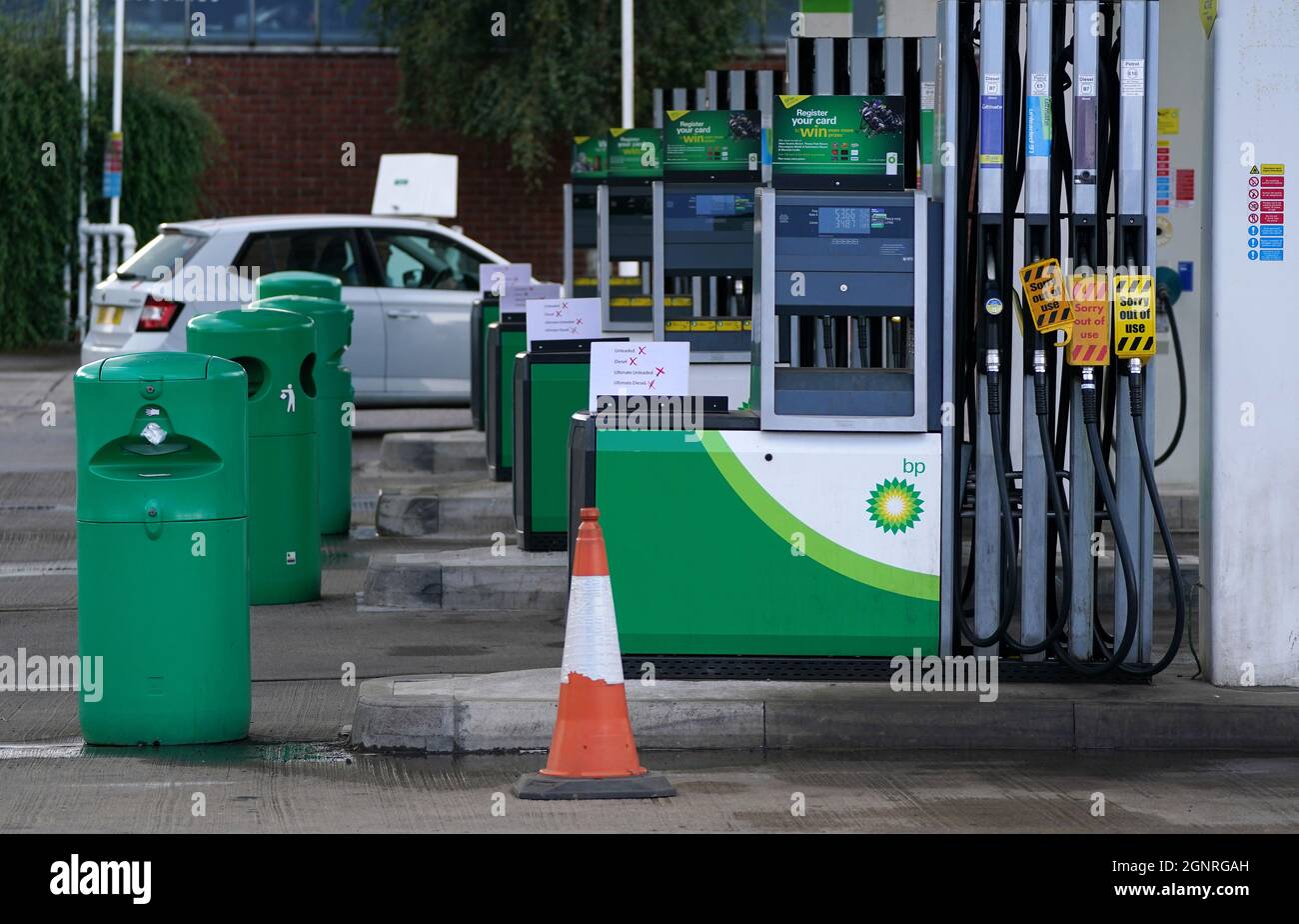 A sign on fuel pumps showing no fuel available at a BP petrol station ...