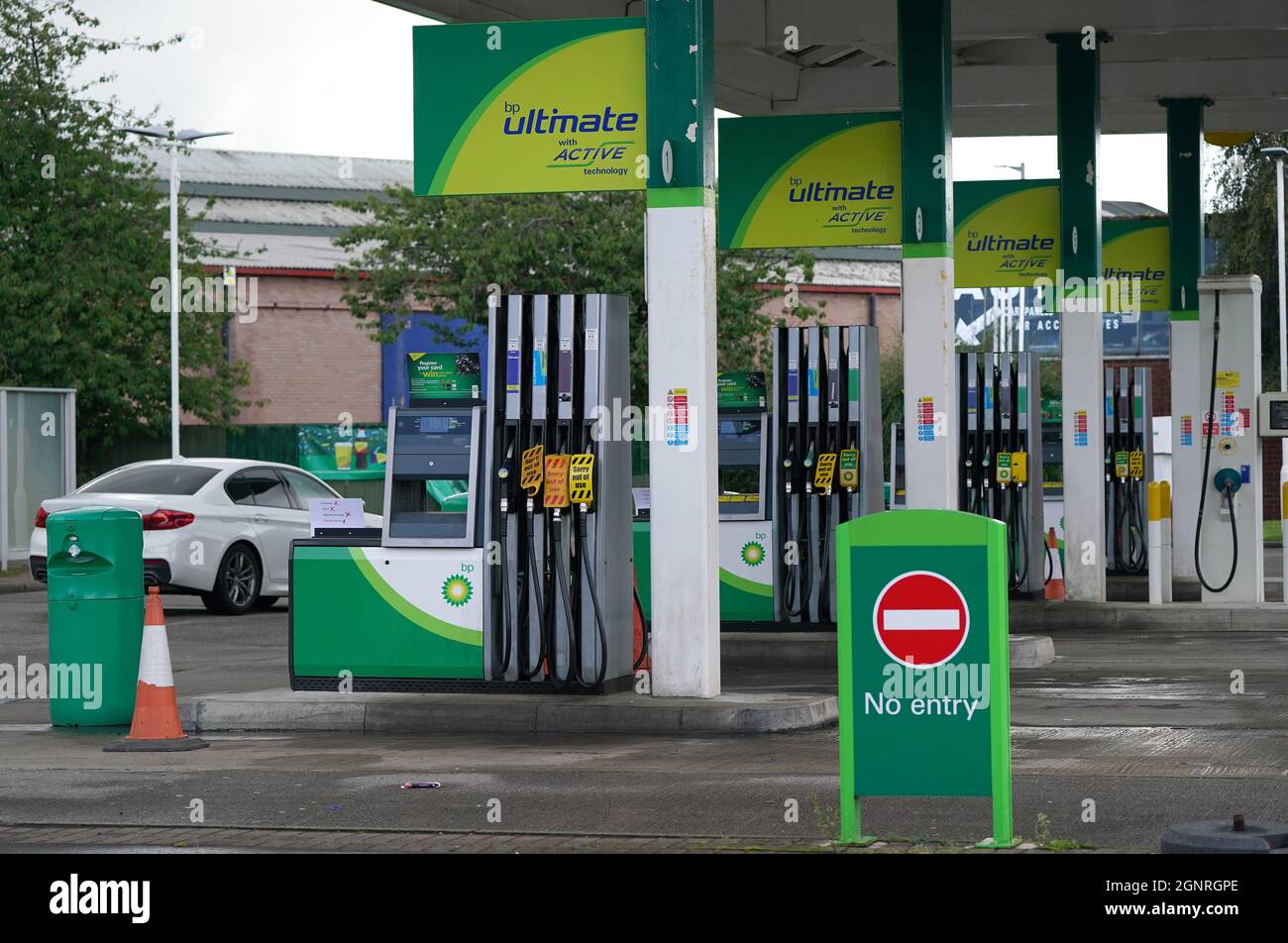 A sign on fuel pumps showing no fuel available at a BP petrol station ...