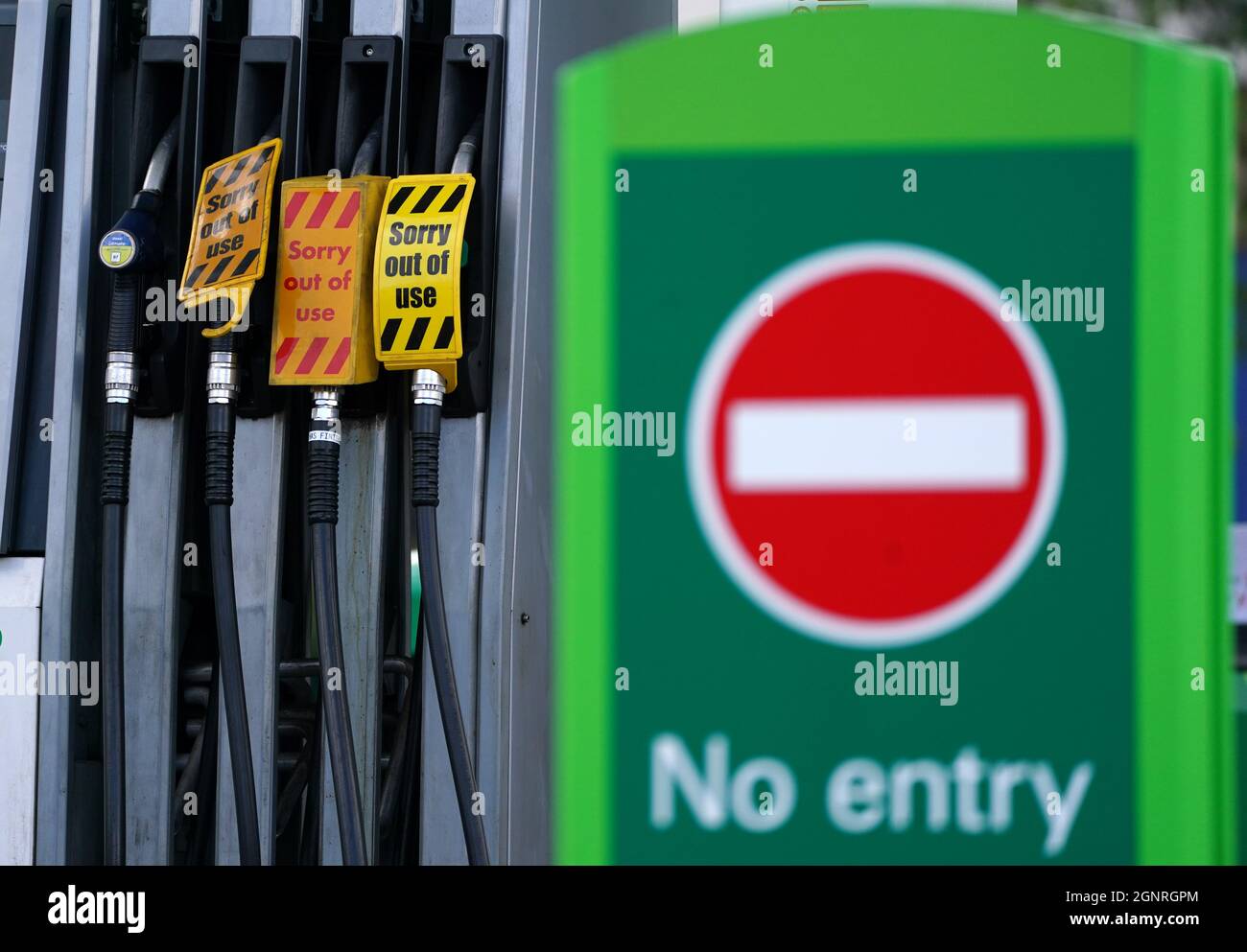 A sign on fuel pumps showing no fuel available at a BP petrol station ...