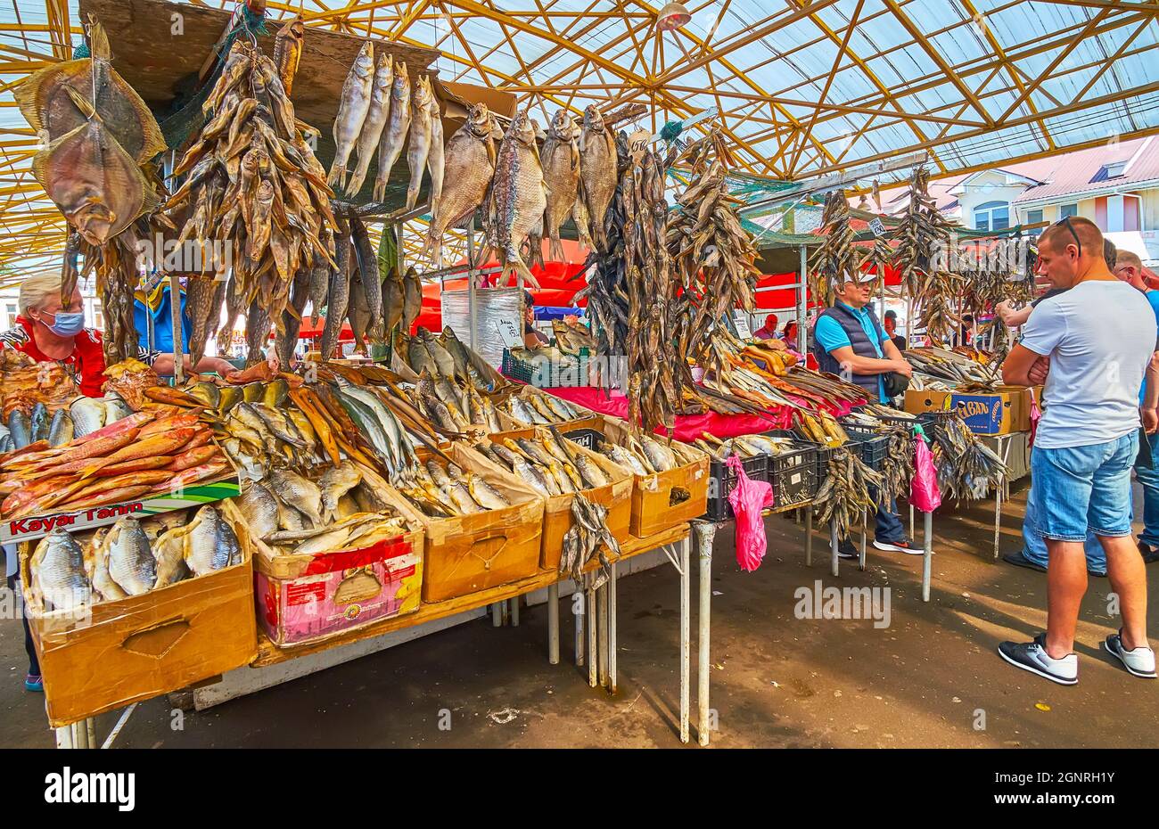 ODESSA, UKRAINE - June 18, 2021: The stalls with dried salted and ...