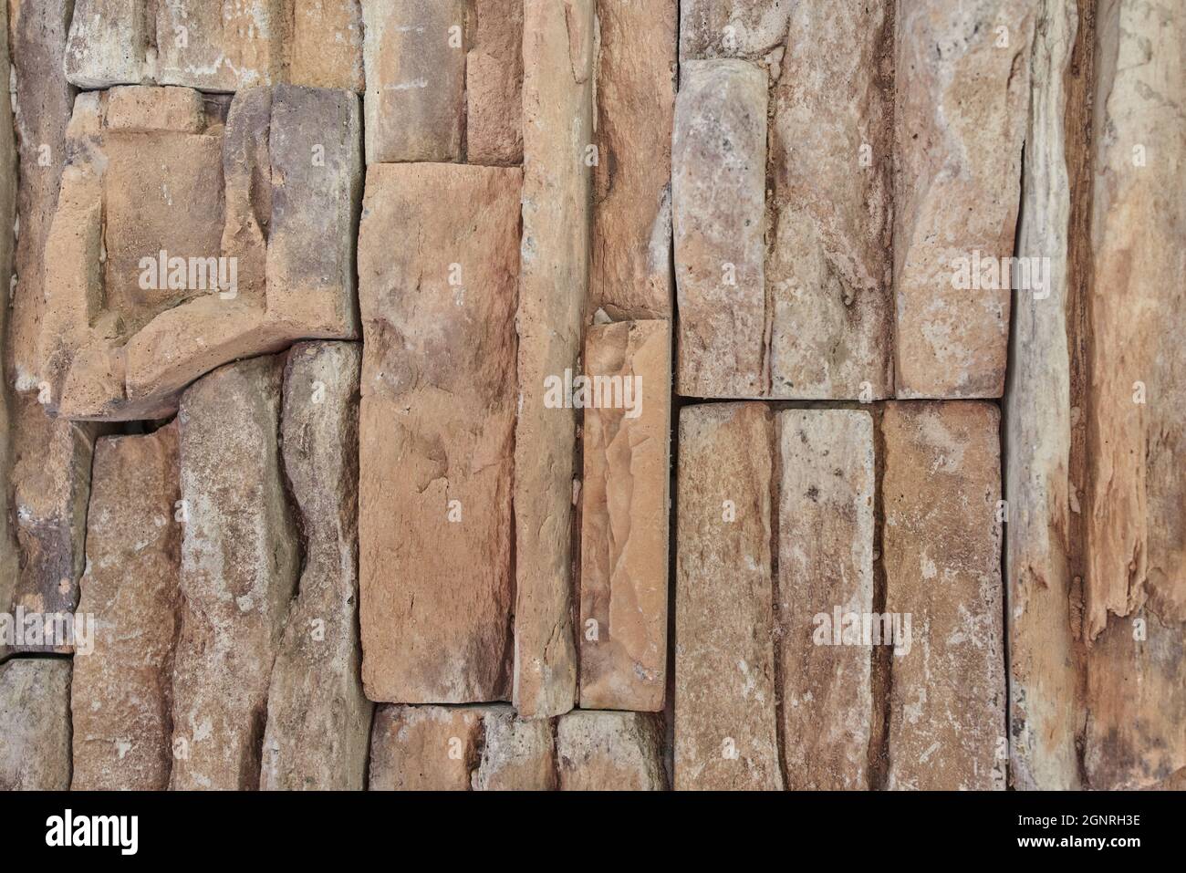 Inlaid cut stone wall inlaid and arranged forming a decorative Stock ...