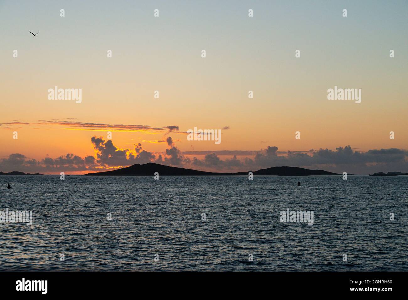 The sun setting behind Samson, Isles of Scilly Stock Photo - Alamy