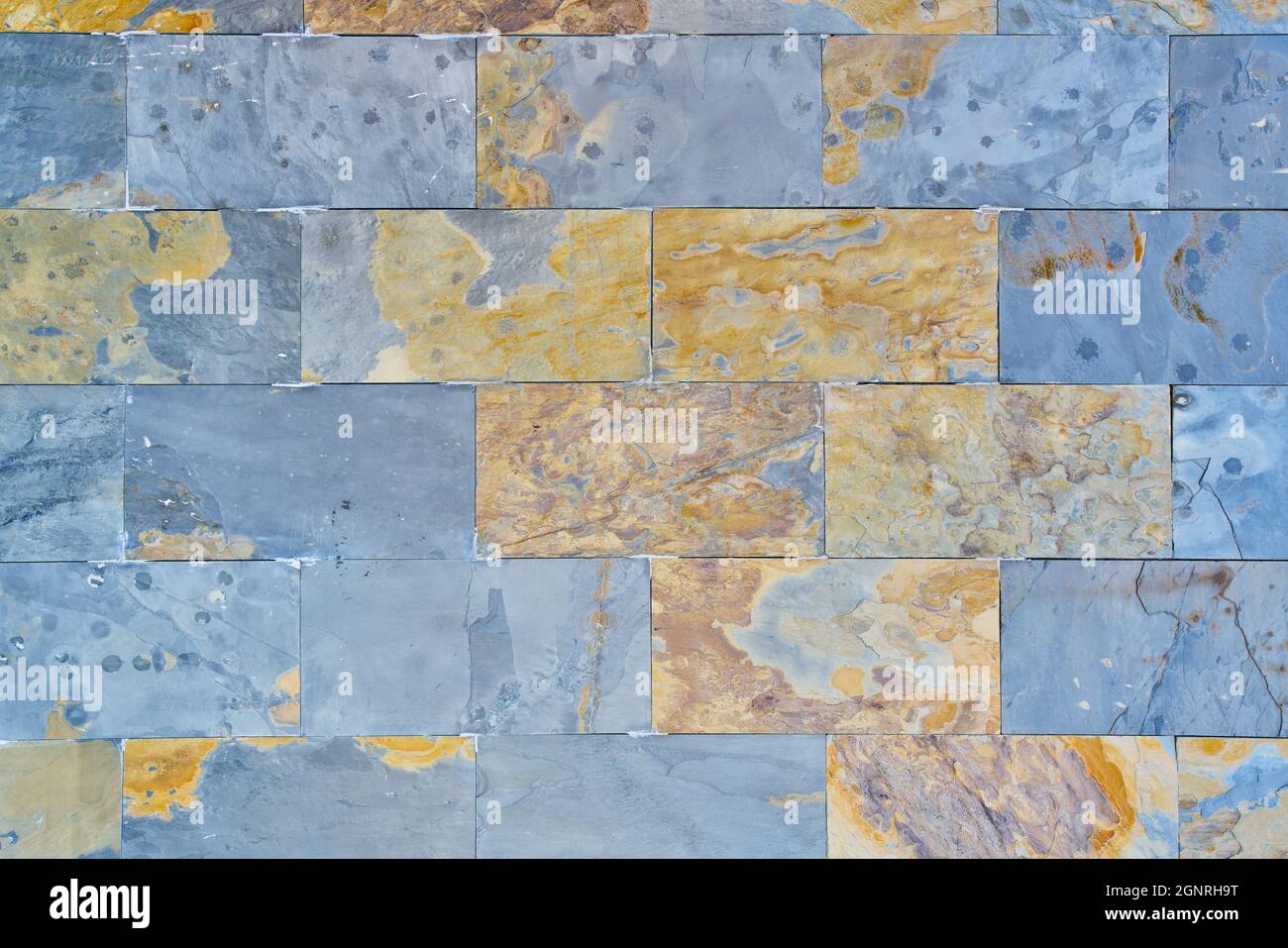 Inlaid cut stone wall inlaid and arranged forming a decorative Stock ...