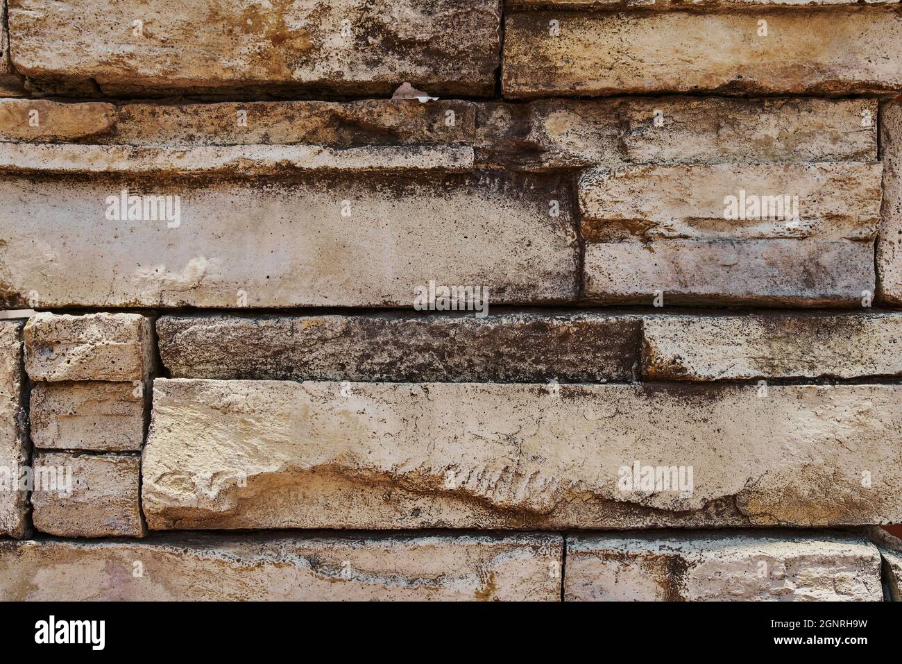 Inlaid cut stone wall inlaid and arranged forming a decorative Stock ...