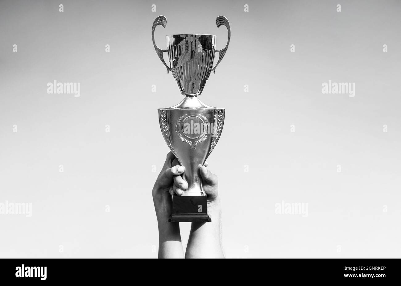 Holding the winners trophy hi-res stock photography and images - Alamy