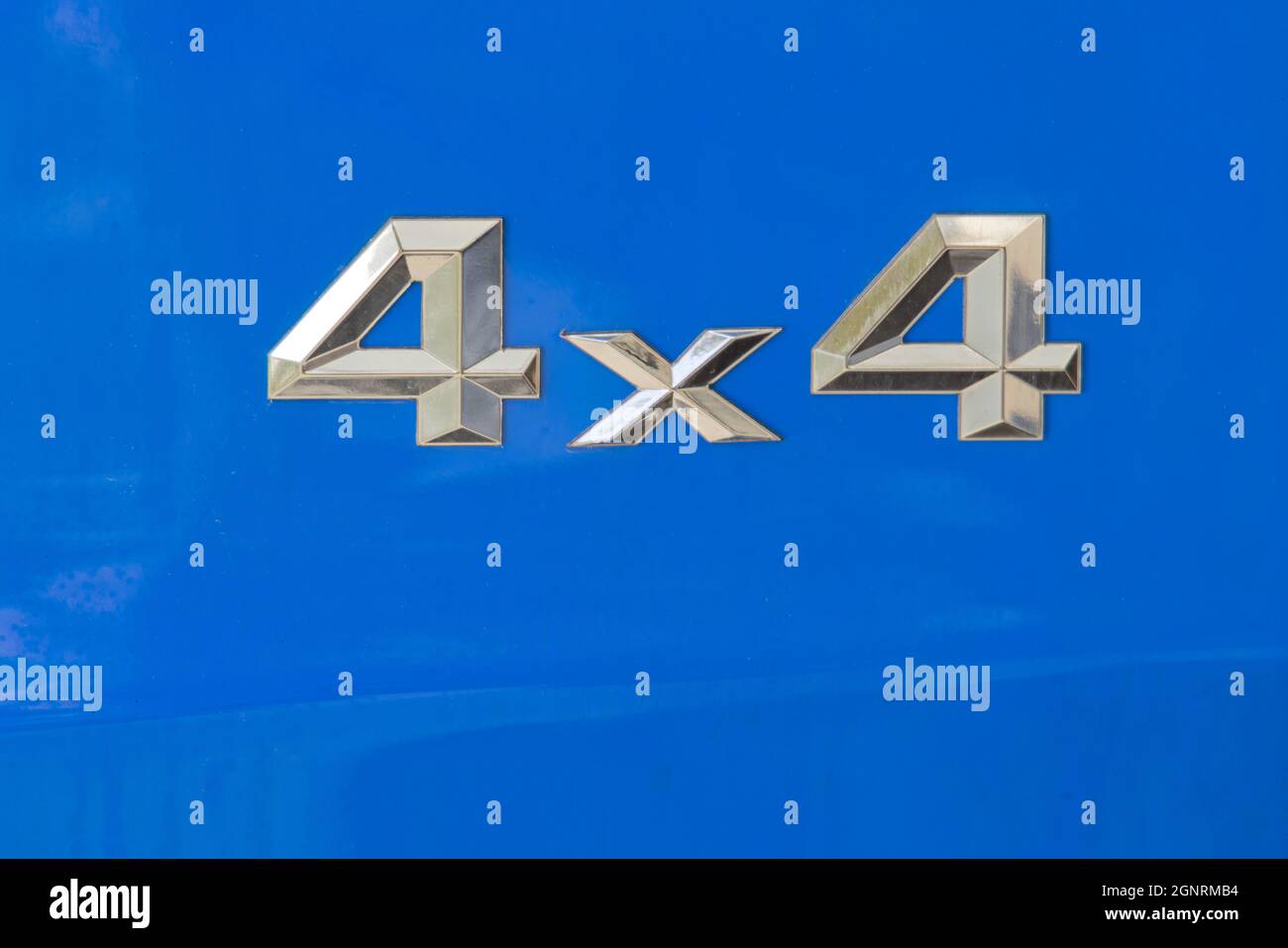 Four Wheel Drive Sign at Blue SUV Stock Photo - Alamy