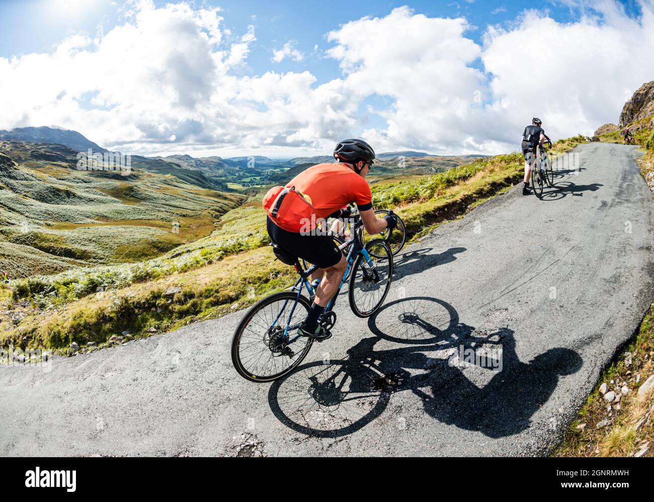 Road cyclist climbing 33% gradient in the Fred Whitton Challenge ...