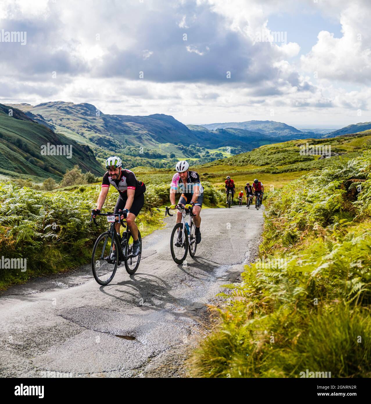 Riders in the Fred Whitton Challenge, Hardknott Pass, Cumbria Stock ...