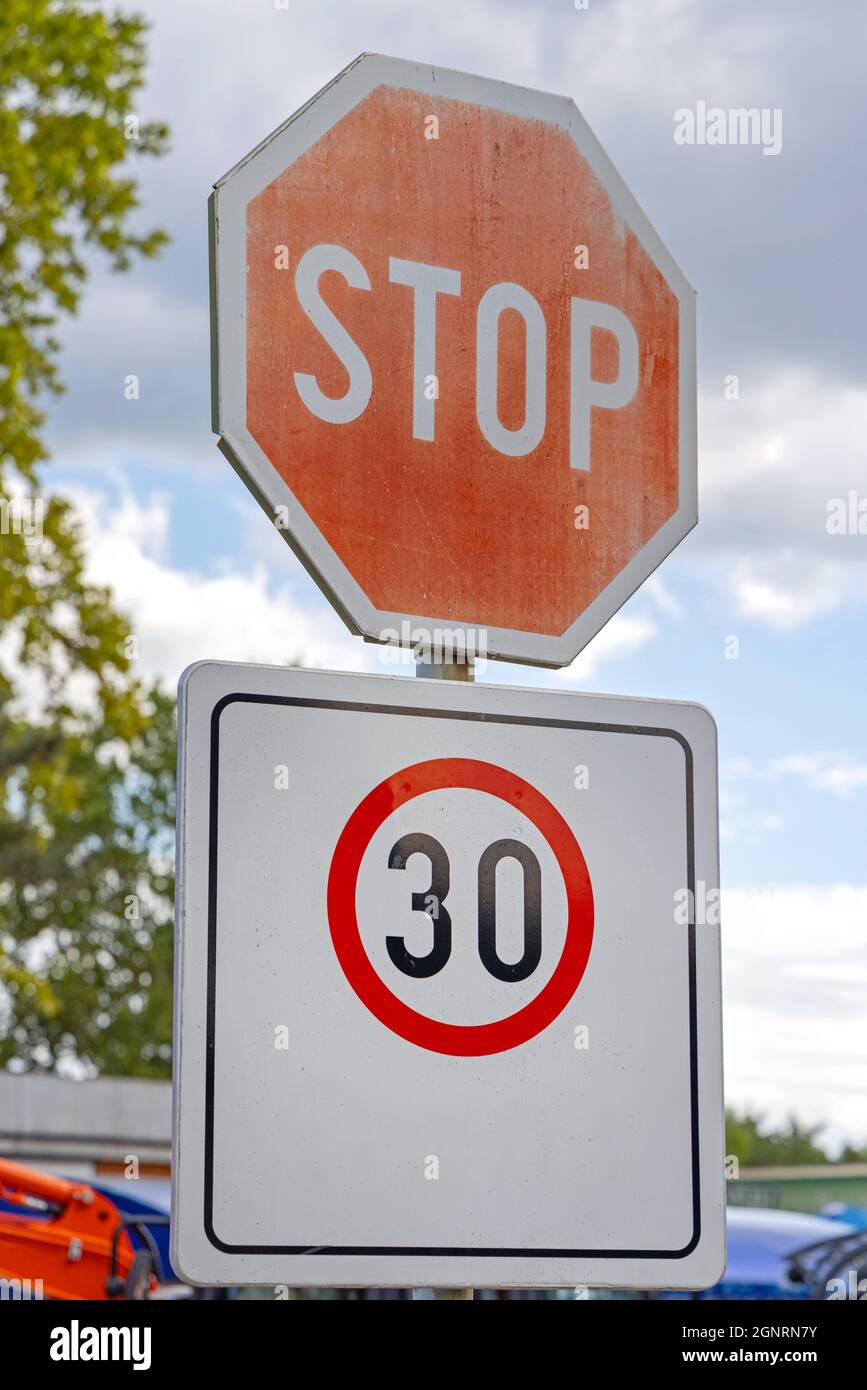 Traffic Sign Stop Speed Limit Thirty Zone Stock Photo - Alamy