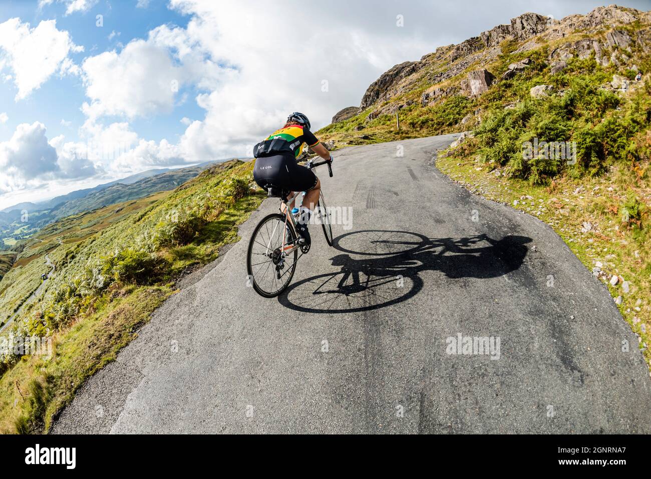 Road cyclist climbing 33% gradient in the Fred Whitton Challenge ...