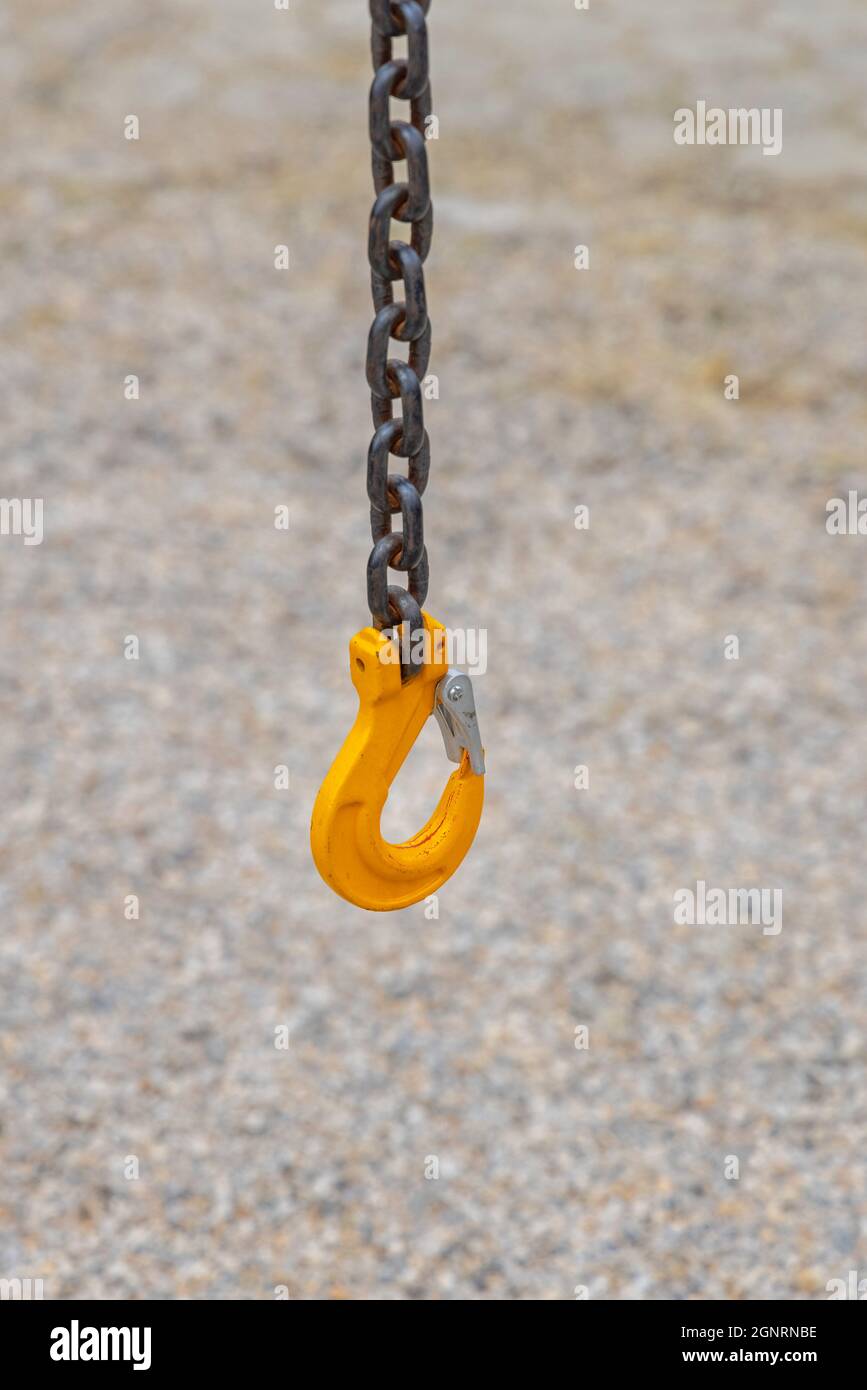 Yellow Hook at Chain Lifting Equipment Machine Stock Photo - Alamy