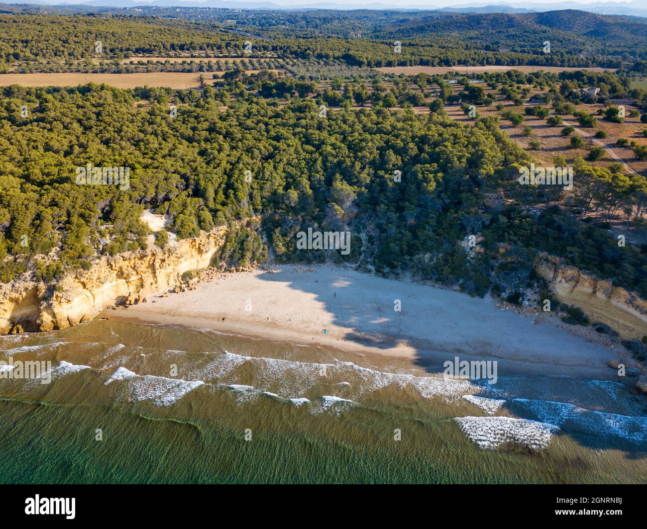 Aerial view of Cala Waikiki beach also Cala Fonda near the village of ...