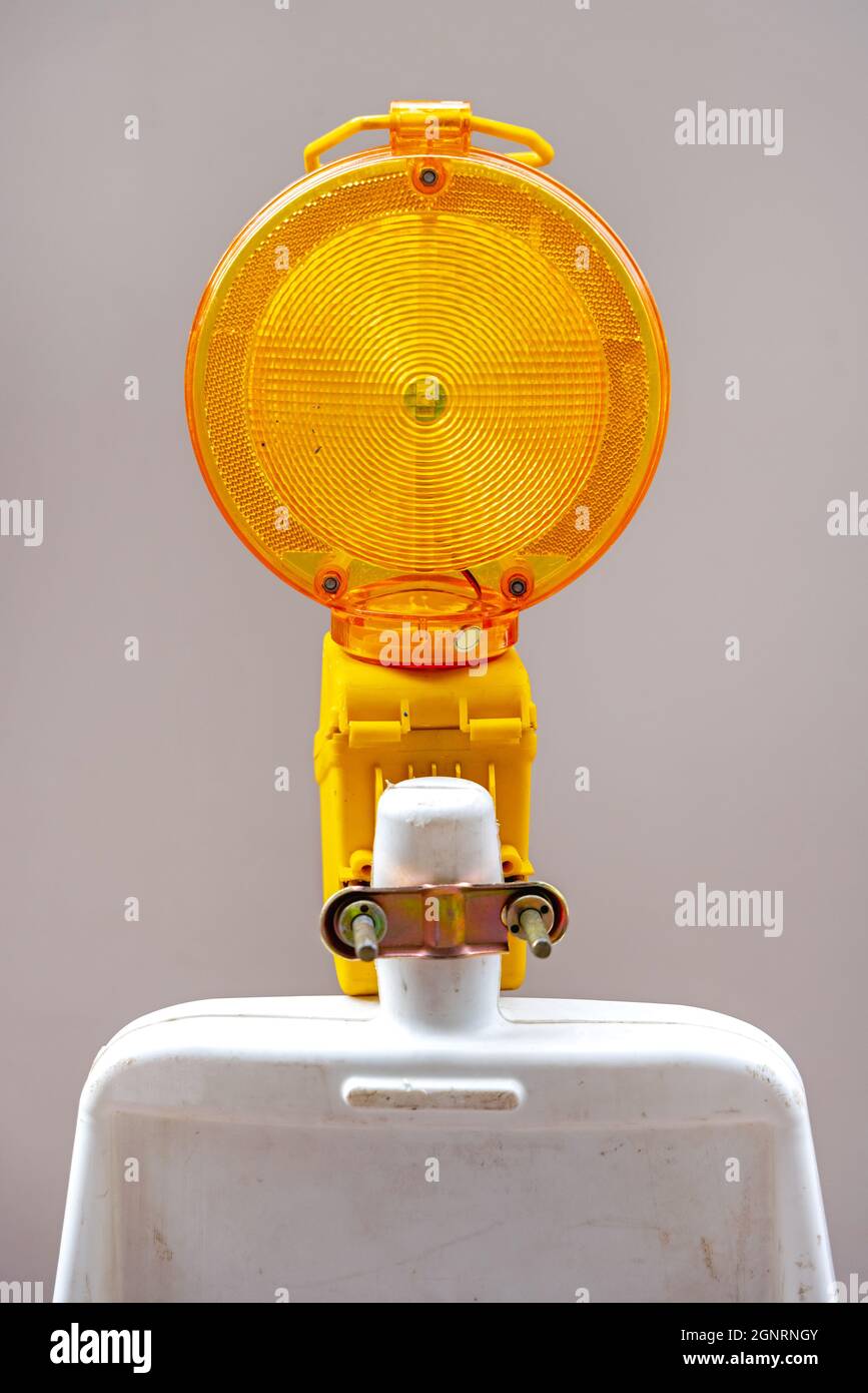 Amber Flashing Light at Top of Construction Site Barrier Stock Photo ...