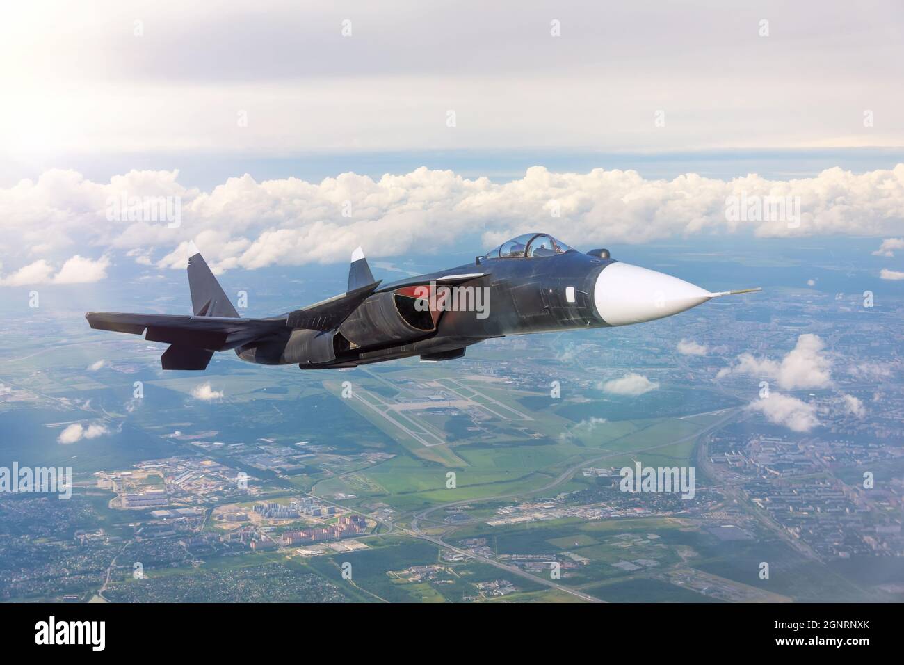 Black combat fighter jet took off from the airport military base ...