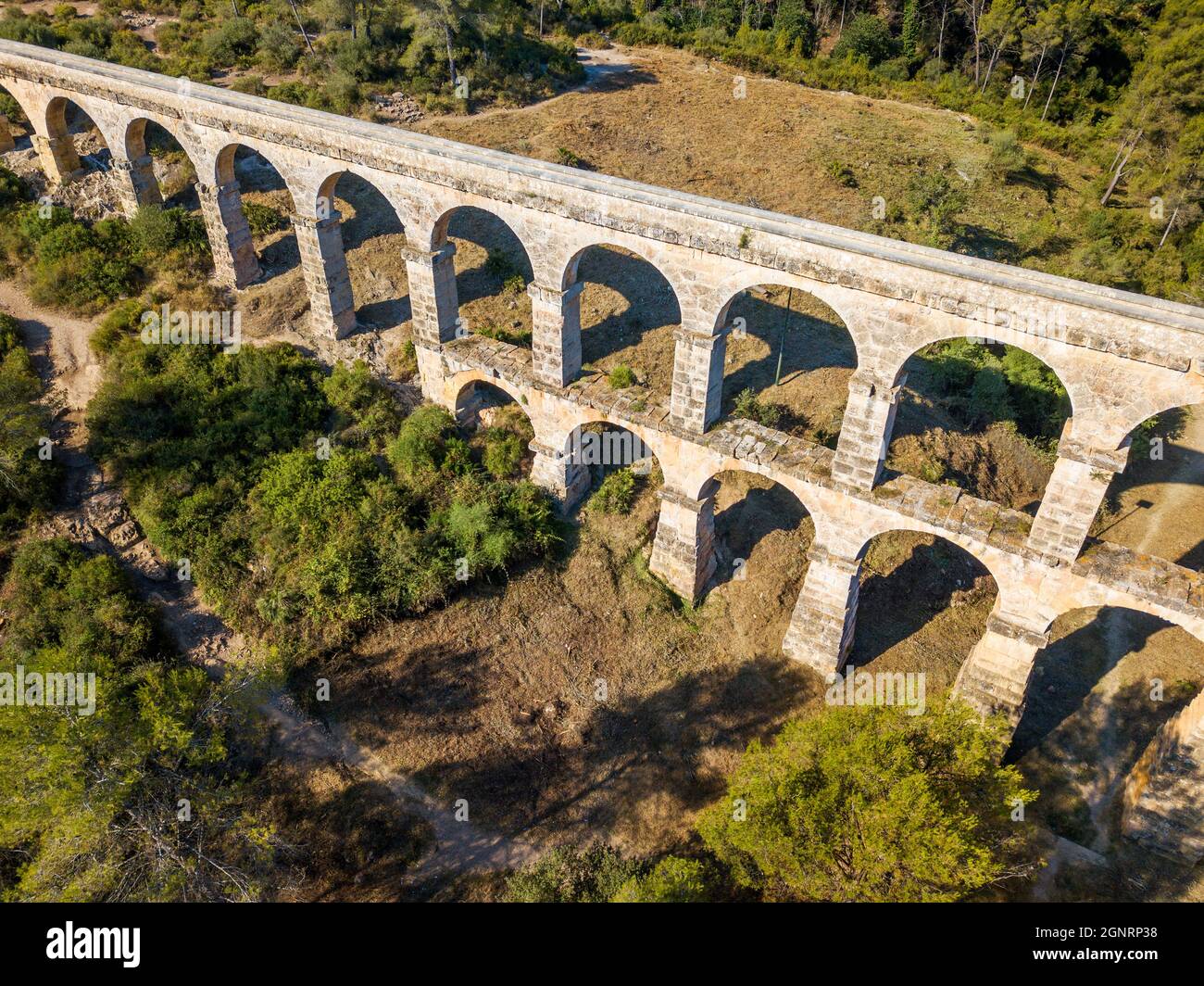 Aerial view of Ancient roman bridge aqueduct Pont del Diable or Devil's ...