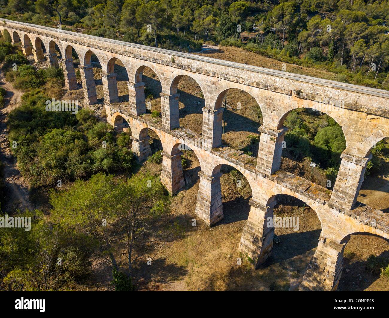 Aerial view of Ancient roman bridge aqueduct Pont del Diable or Devil's ...