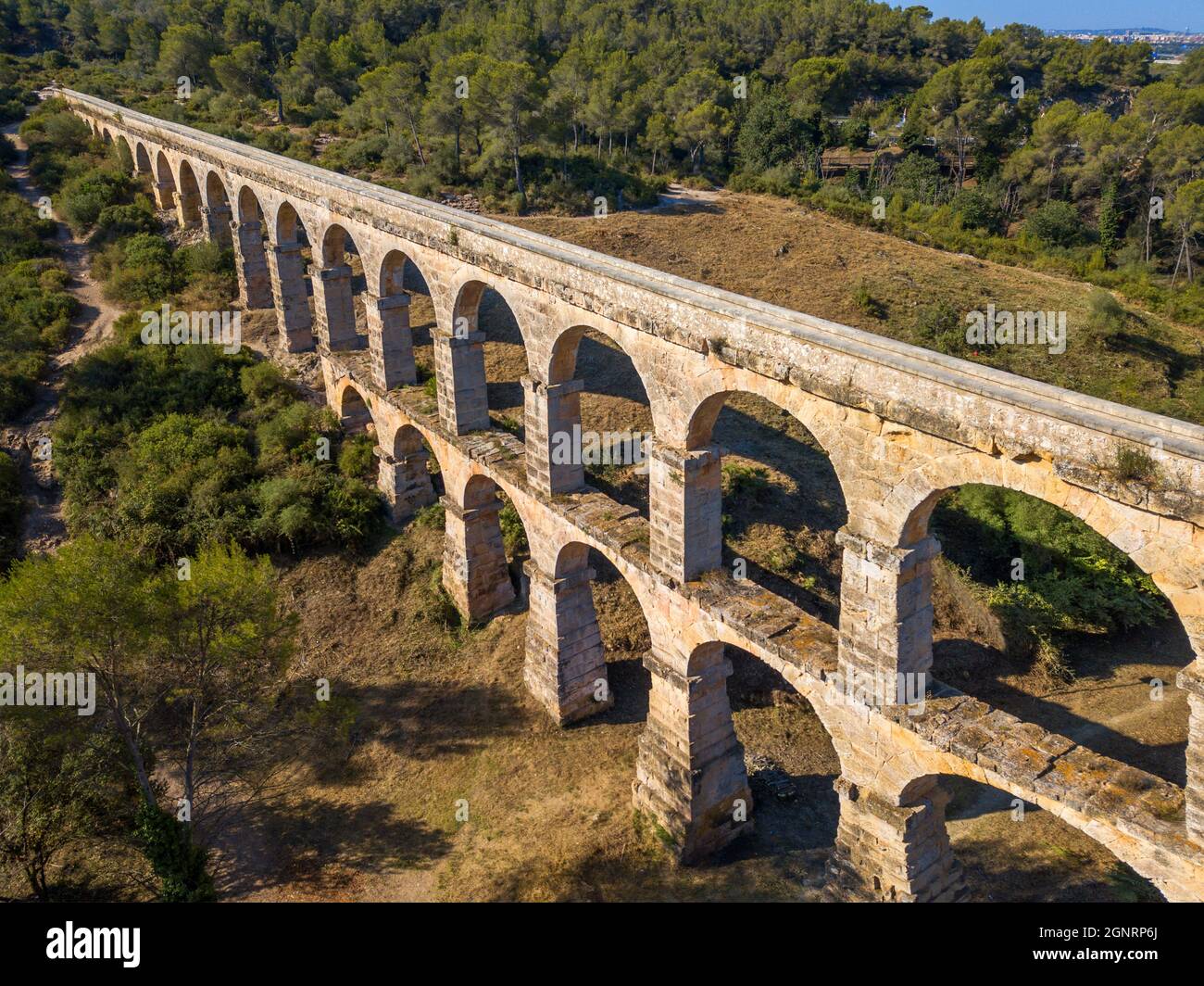 Aerial view of Ancient roman bridge aqueduct Pont del Diable or Devil's ...