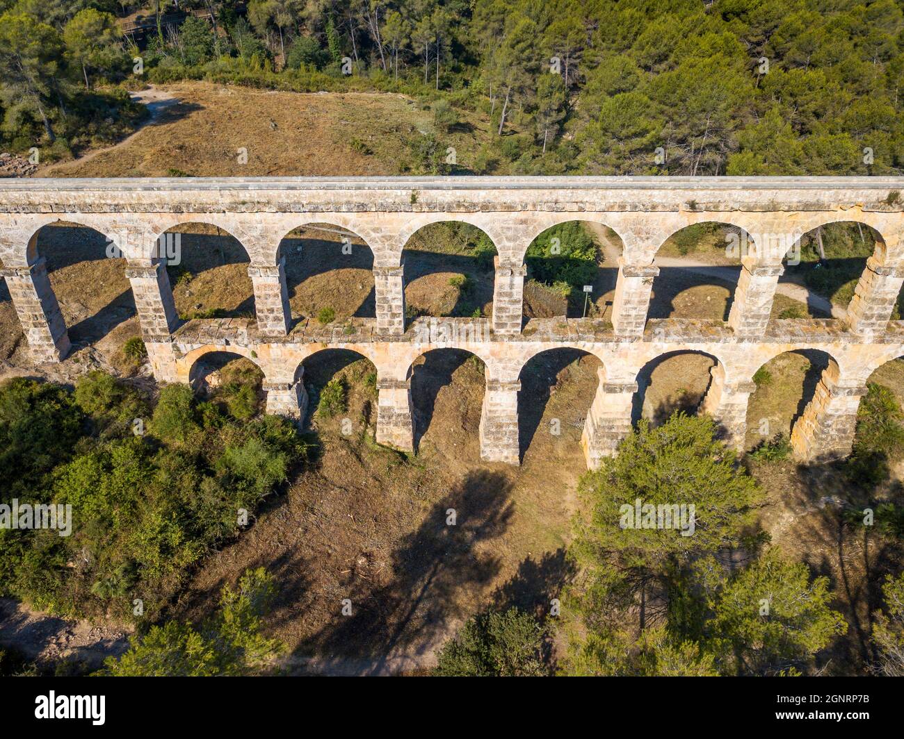 Aerial view of Ancient roman bridge aqueduct Pont del Diable or Devil's ...