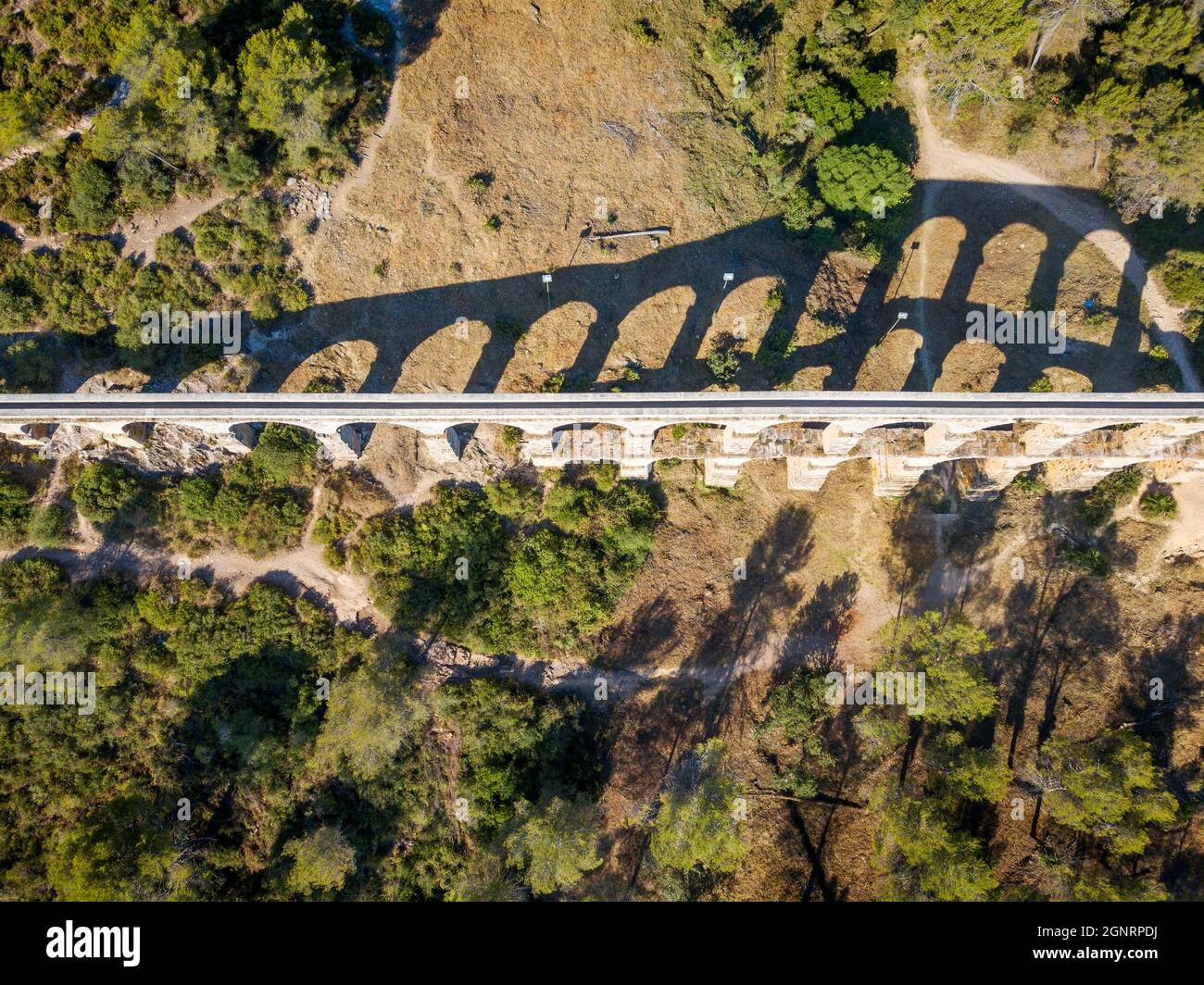 Aerial view of Ancient roman bridge aqueduct Pont del Diable or Devil's ...