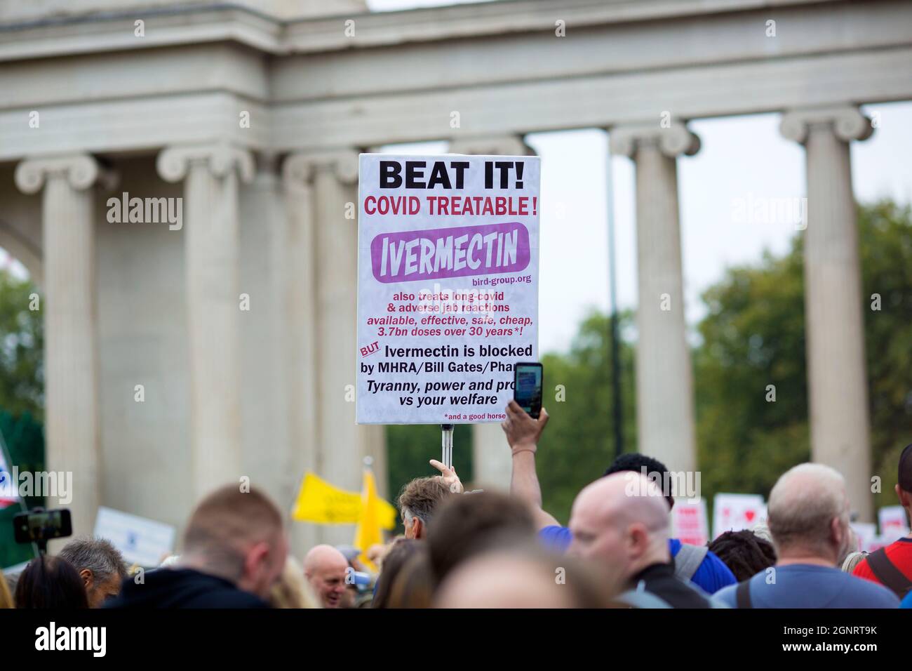 People gather and march during a Medical Freedom March against the ...