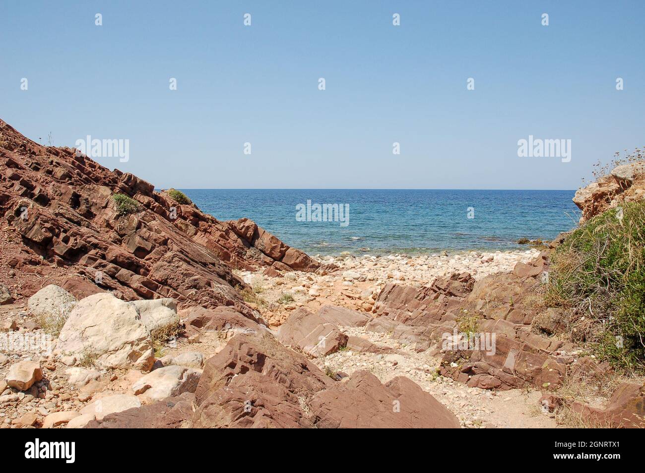 Beach scene Mallorca Rocks red Stock Photo - Alamy