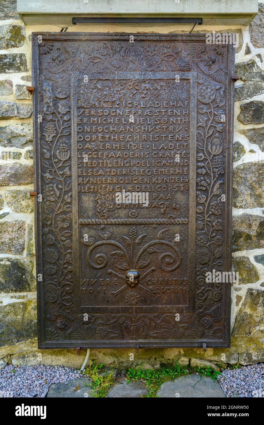 Burial plaque from 1672 (?) for a parish priest and wife at Holla ...