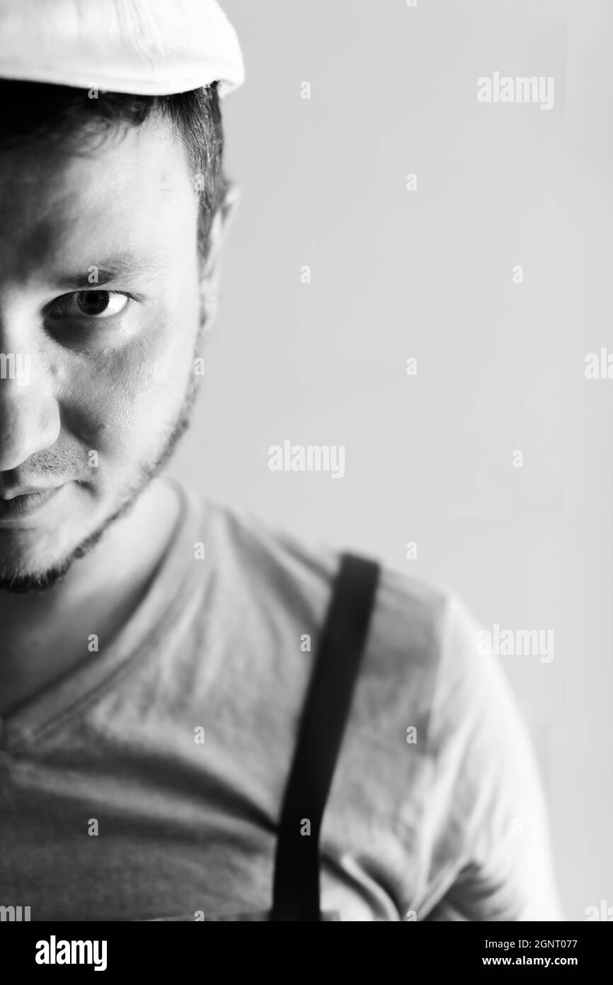 Young worker in white uniform Black and White Stock Photos & Images - Alamy