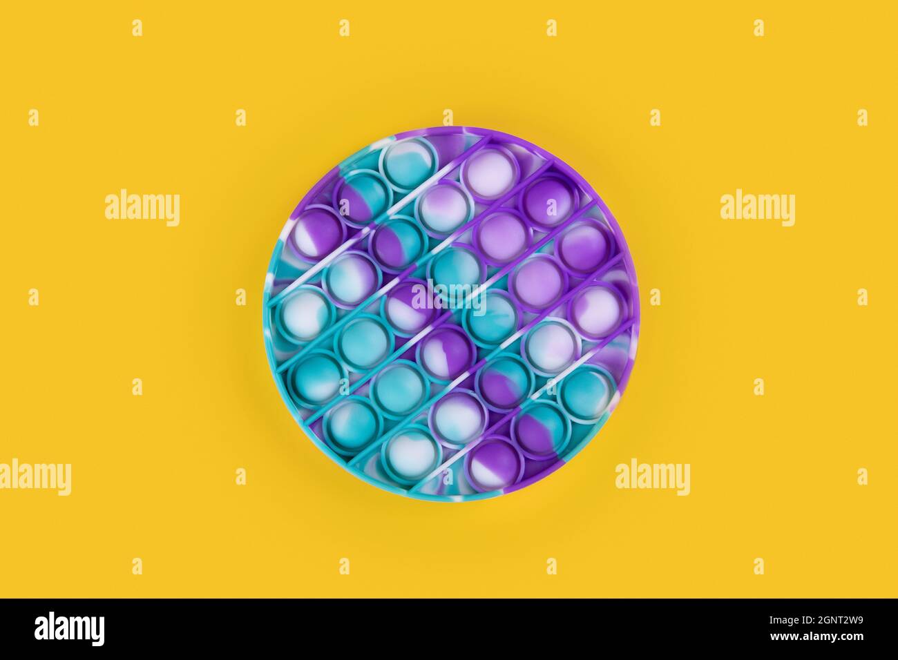 Pastel color round popit toy antistress for children and adults on a ...