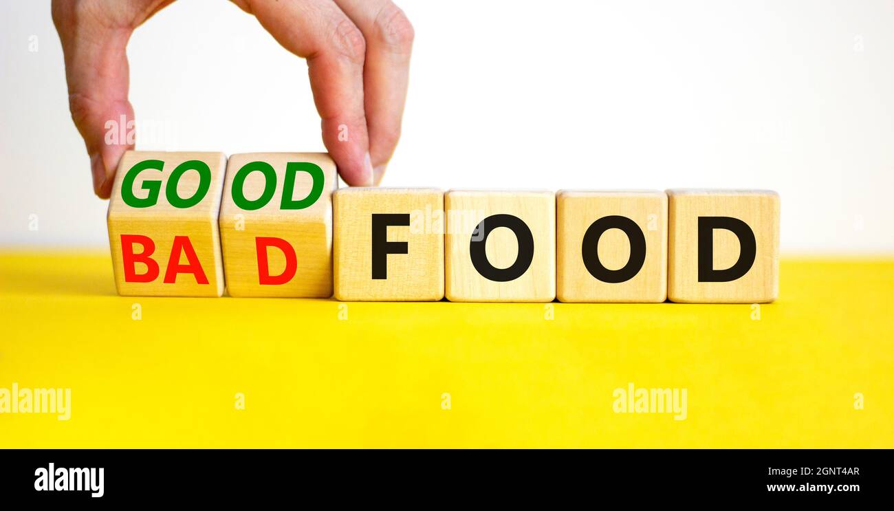 Good or bad food symbol. Doctor turns cubes and changes words 'bad food ...
