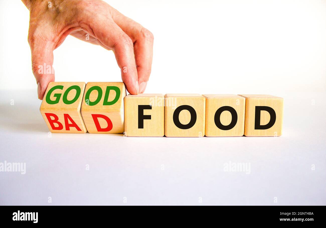 Good or bad food symbol. Doctor turns cubes and changes words 'bad food ...