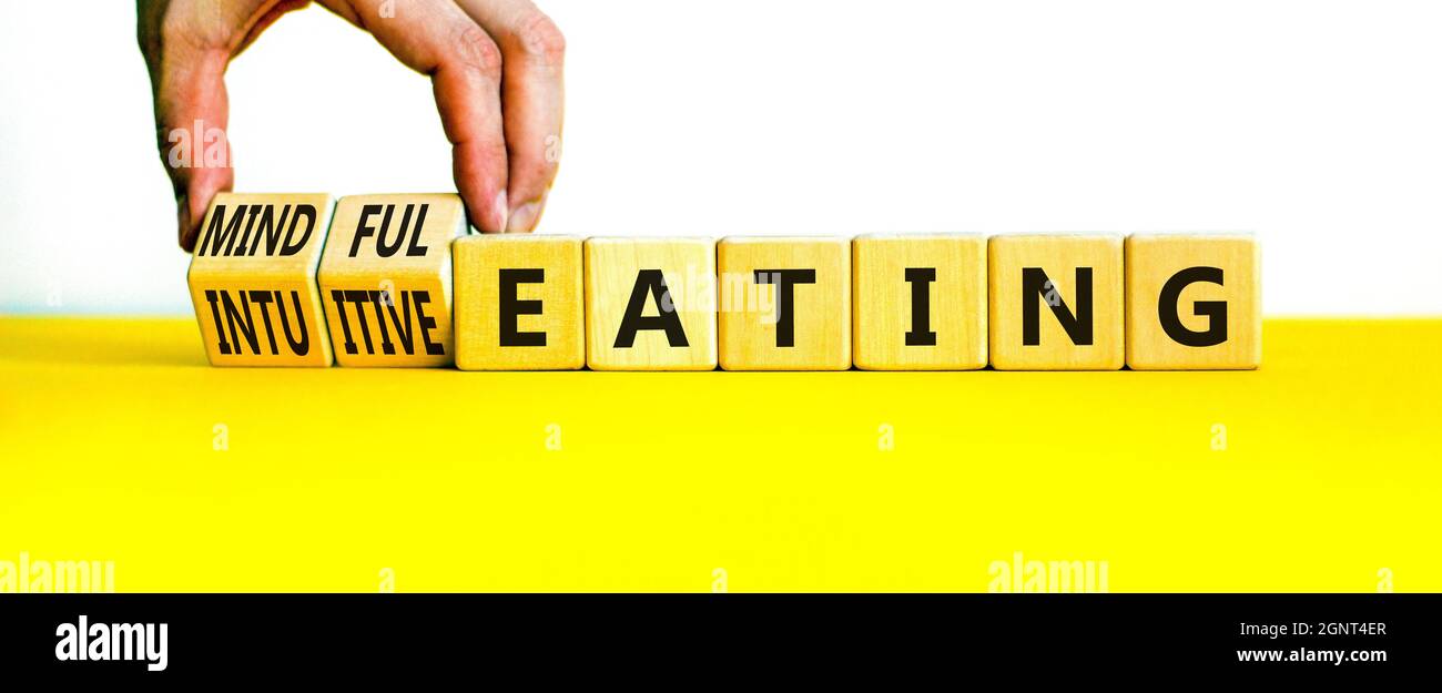 Mindful or intuitive eating symbol. Doctor turns cubes and changes ...