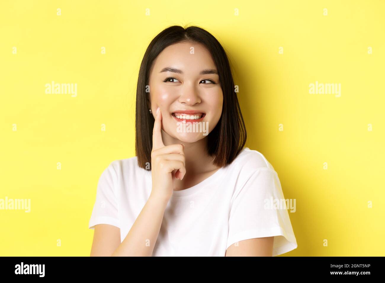 Beauty and skincare. Close up of young asian woman with short dark hair ...