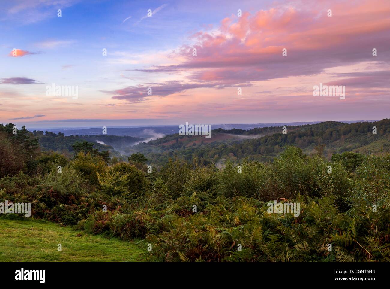 Low clouds and dramatic colours in the sky over the Devils Punch Bowl ...
