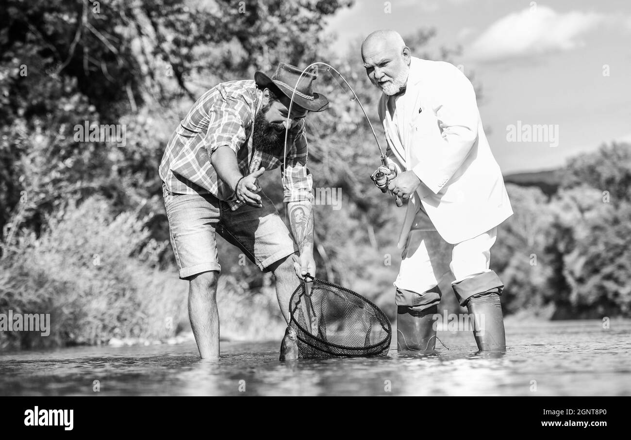 Nothing but family. happy fishermen friendship. Two male friends ...