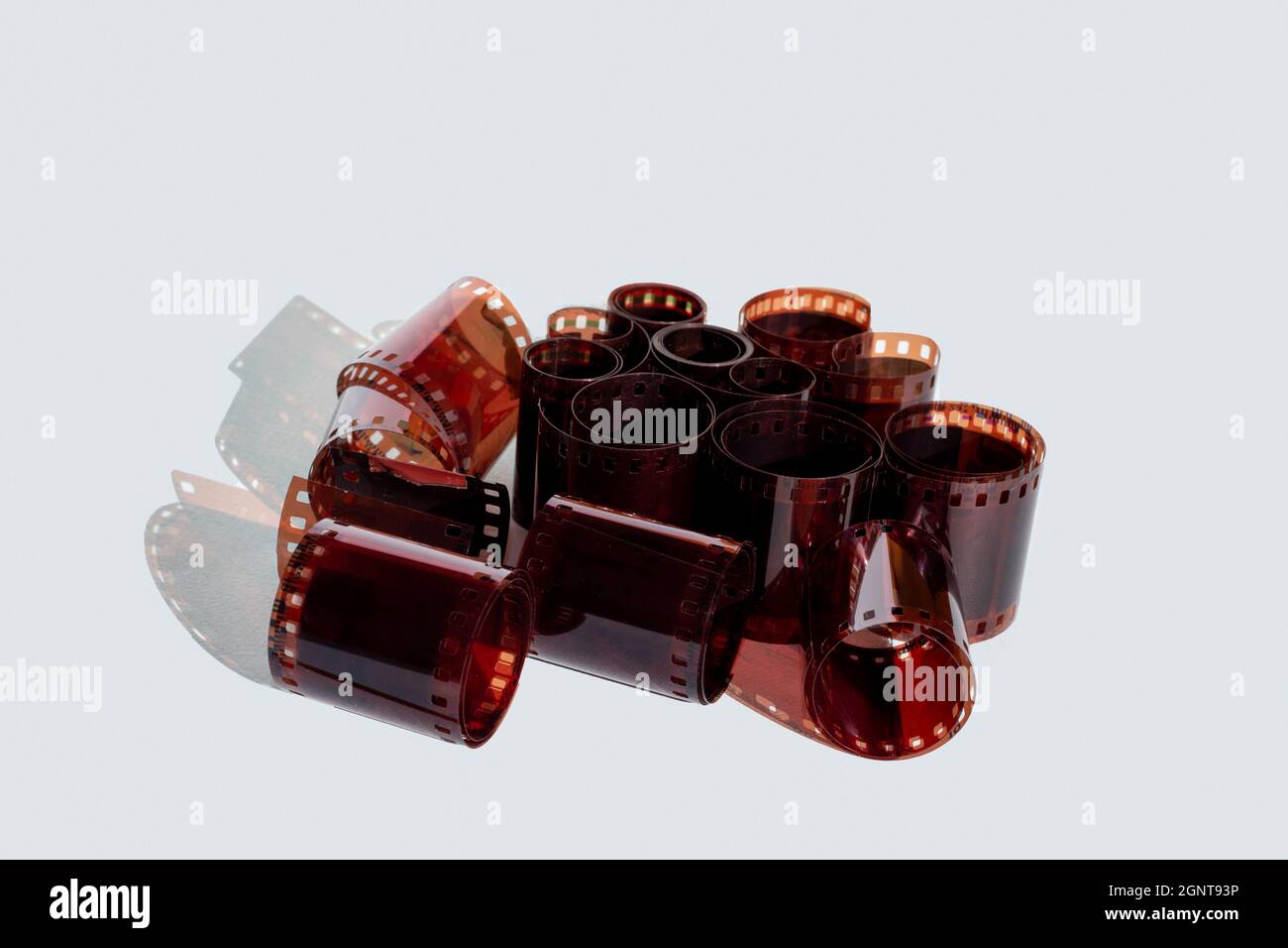 Used 35mm film rolls on white background, copy space Stock Photo - Alamy