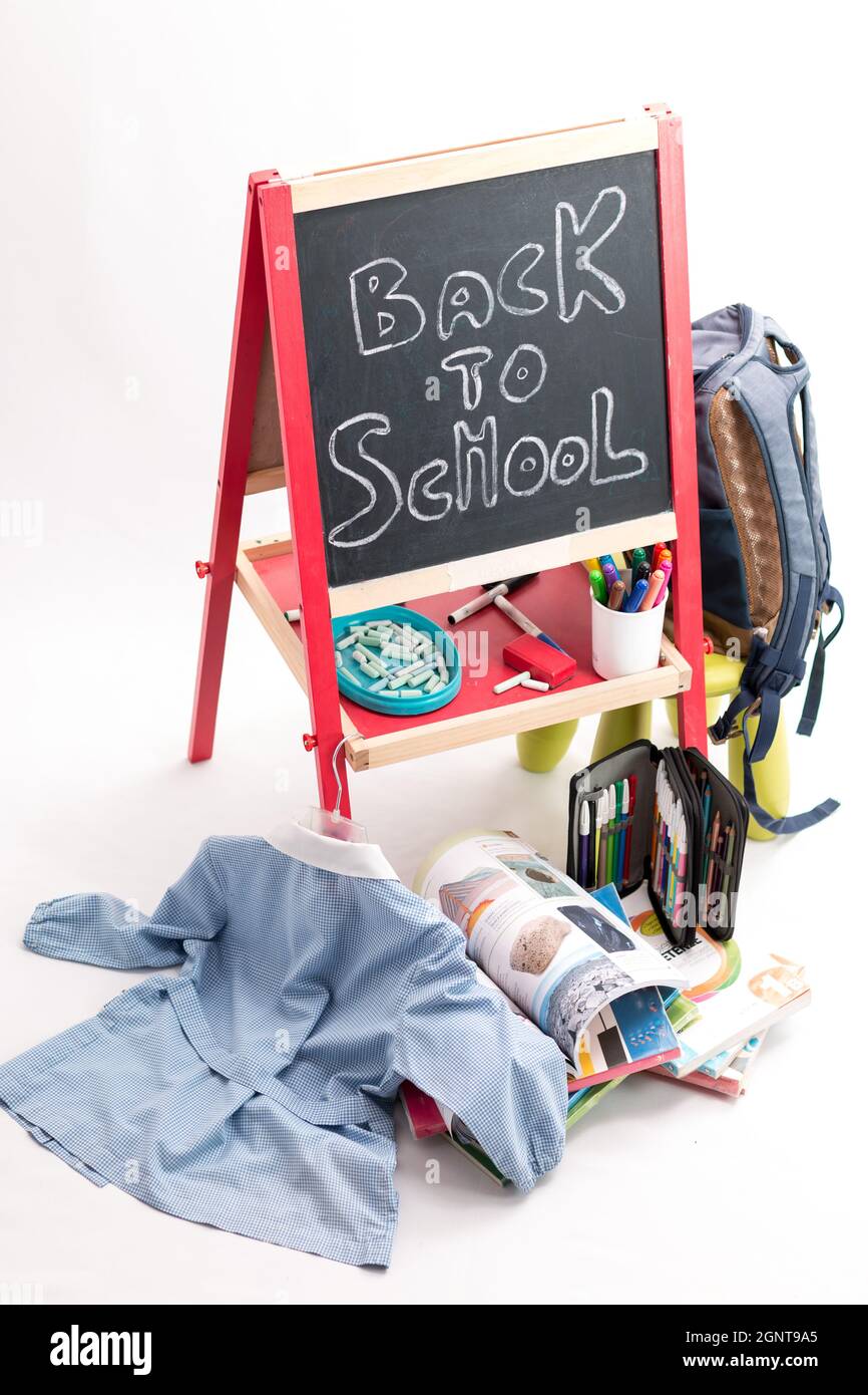Back to school background - chalkboard, backpack and school items ...