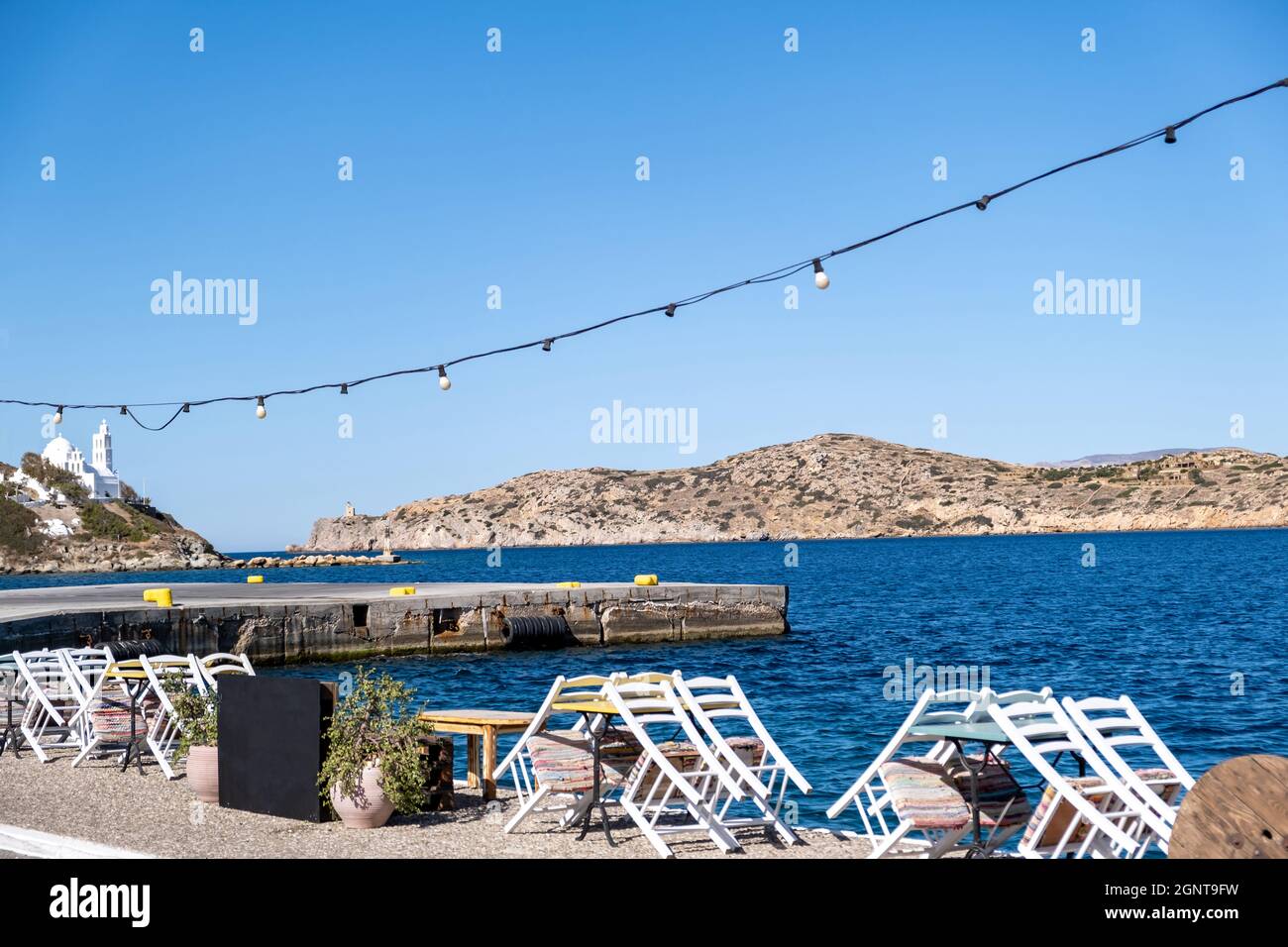 Ios island, port, Cyclades, Greece. Greek outdoors cafe restaurant at ...