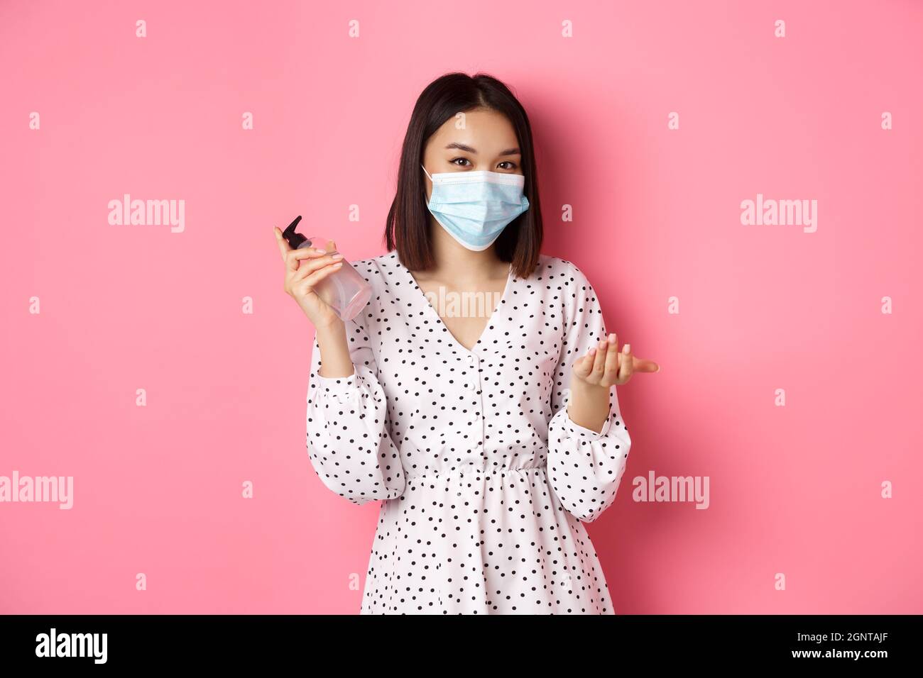 Covid-19, pandemic and lifestyle concept. Cute asian woman clean hands ...
