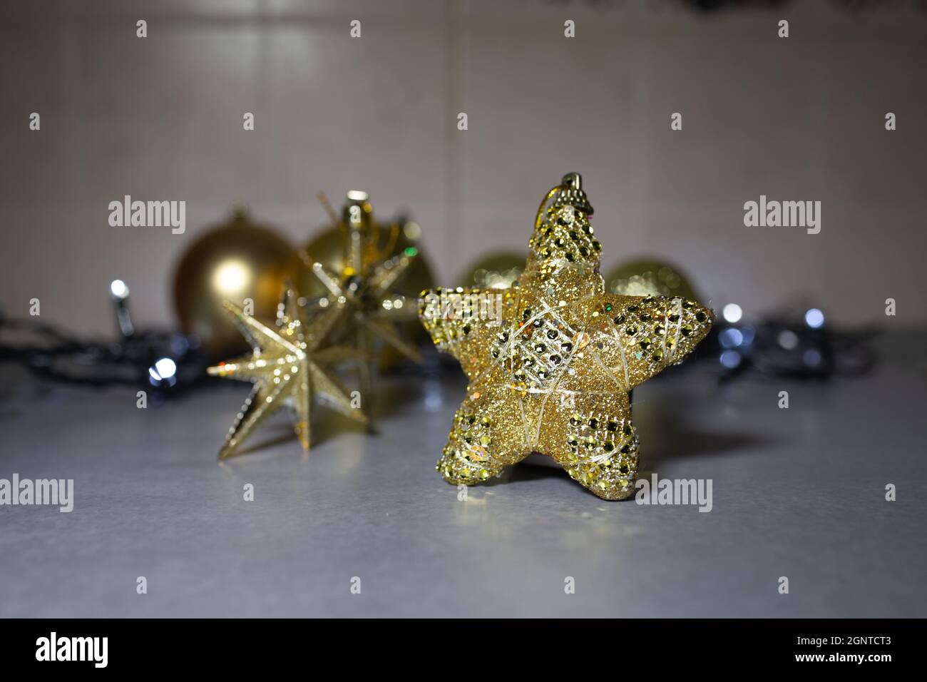 Golden star christmas toy hi-res stock photography and images - Alamy
