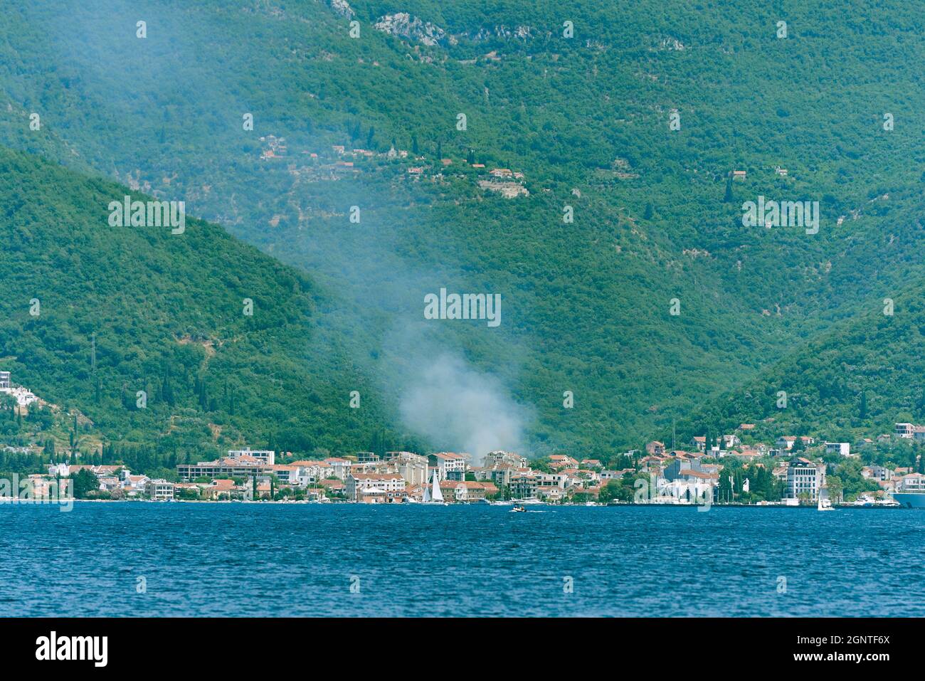 Fire in a European city by the sea Stock Photo - Alamy